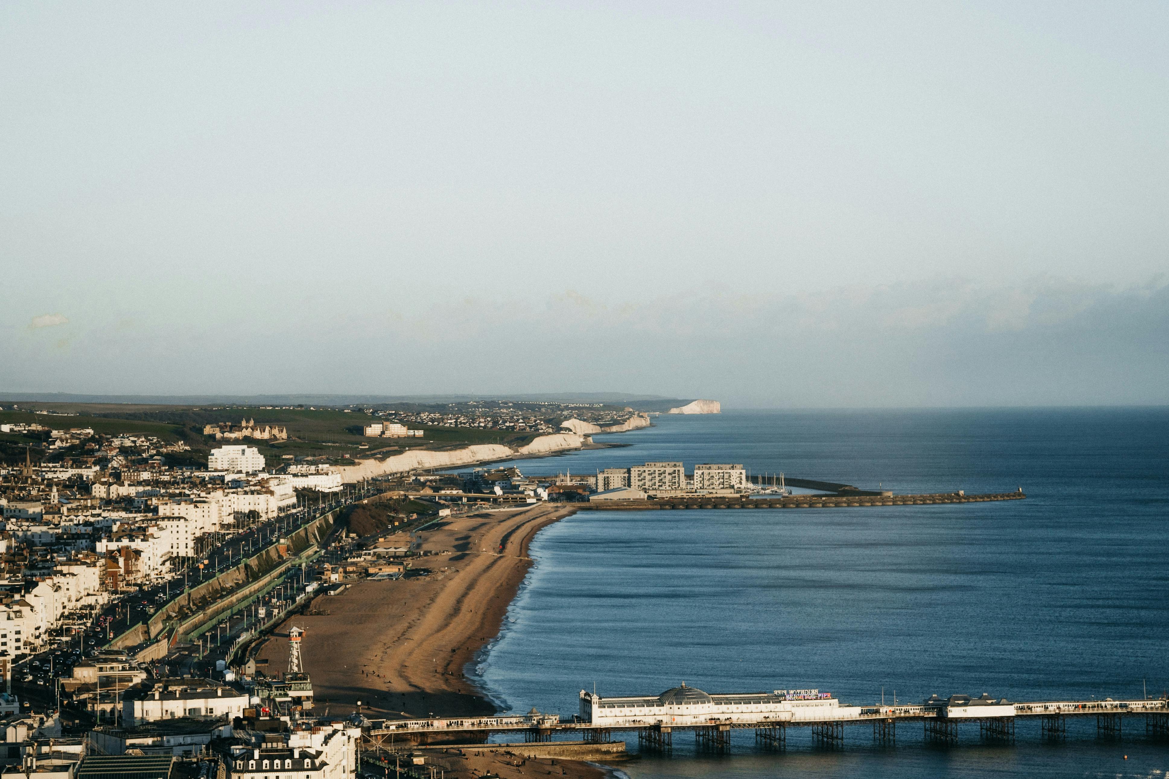 Aerial Panorama of Brighton Waterfront and Piers · Free Stock Photo