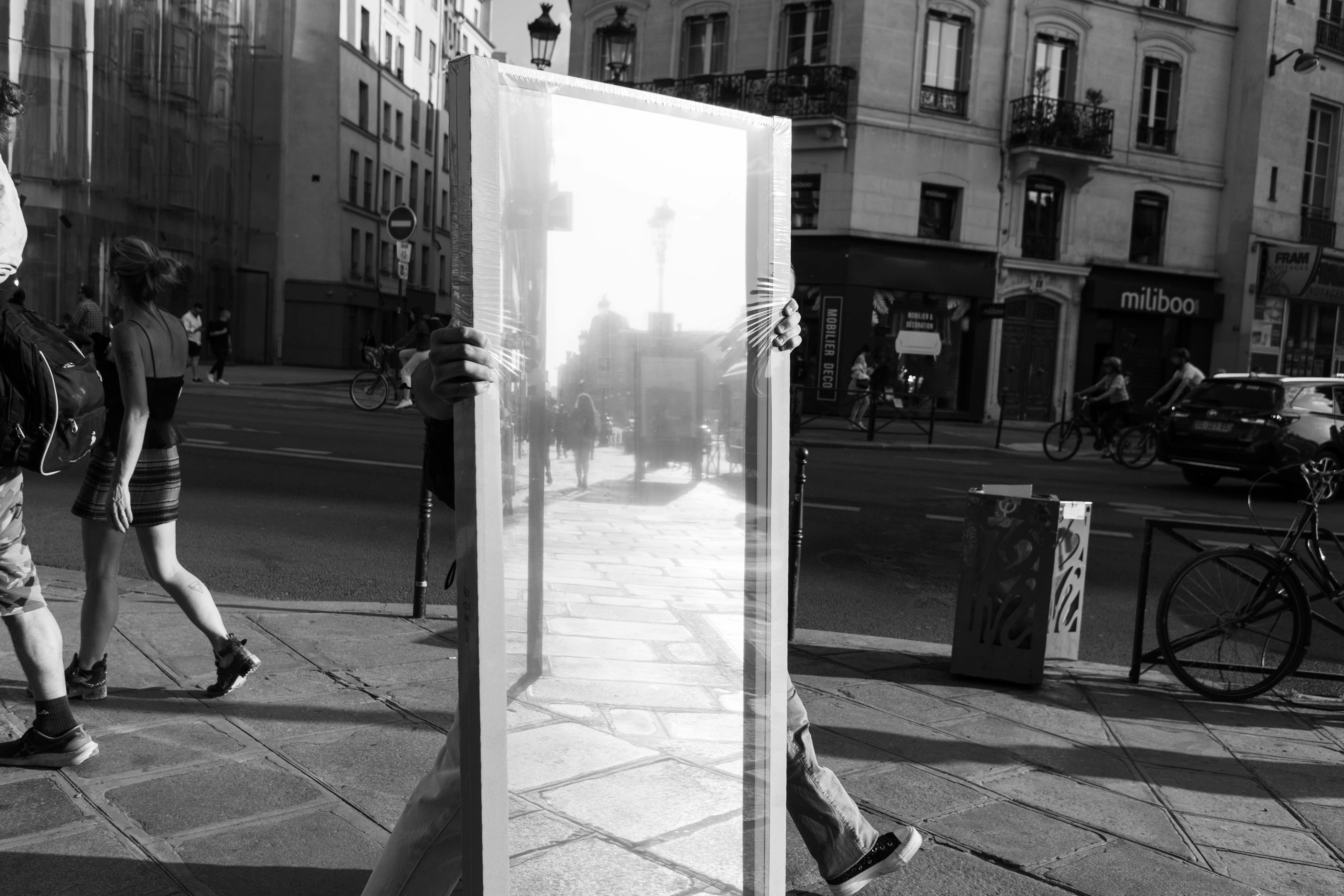 Person Walking with Mirror on Street · Free Stock Photo