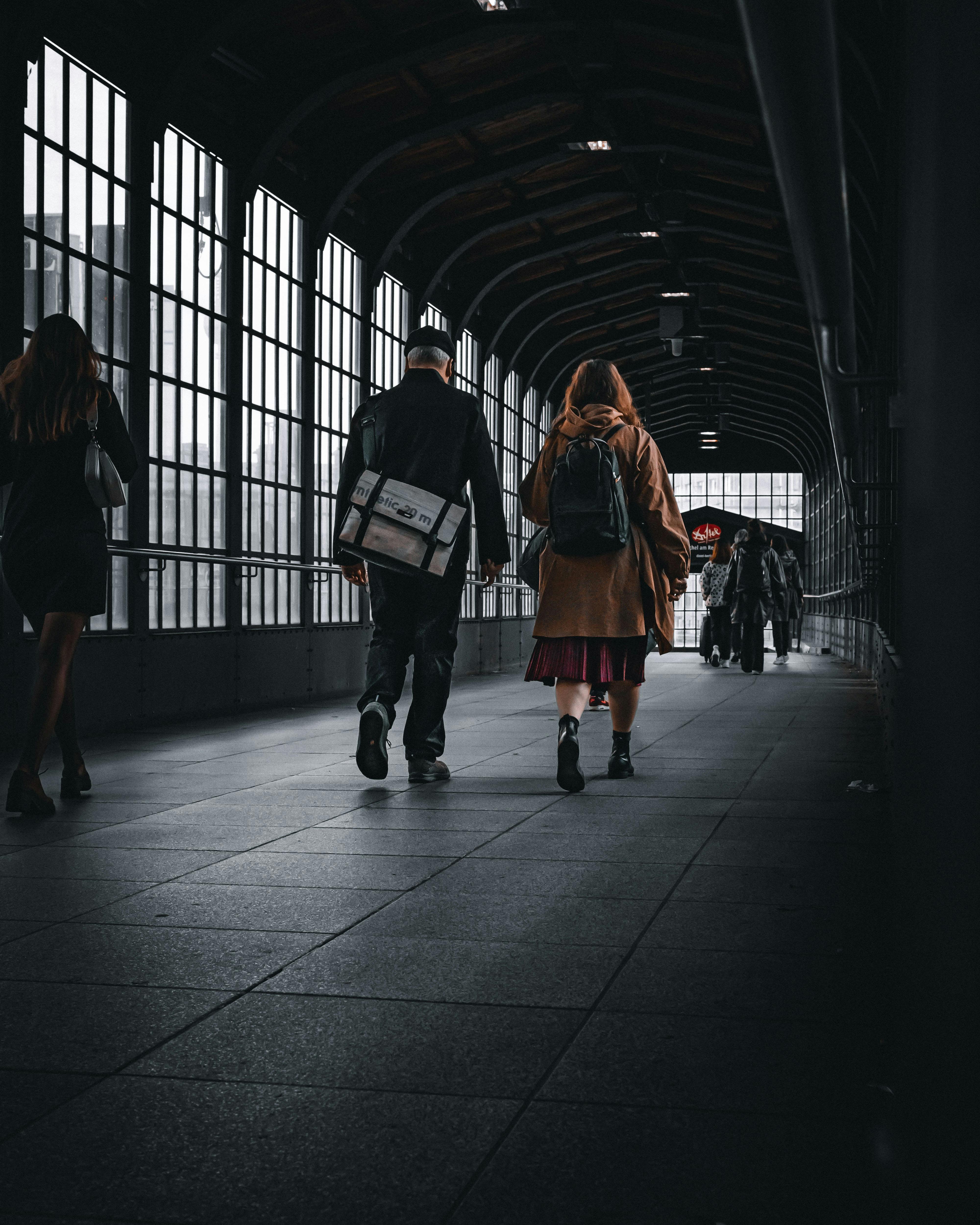 Back View of Two People Walking on Street · Free Stock Photo
