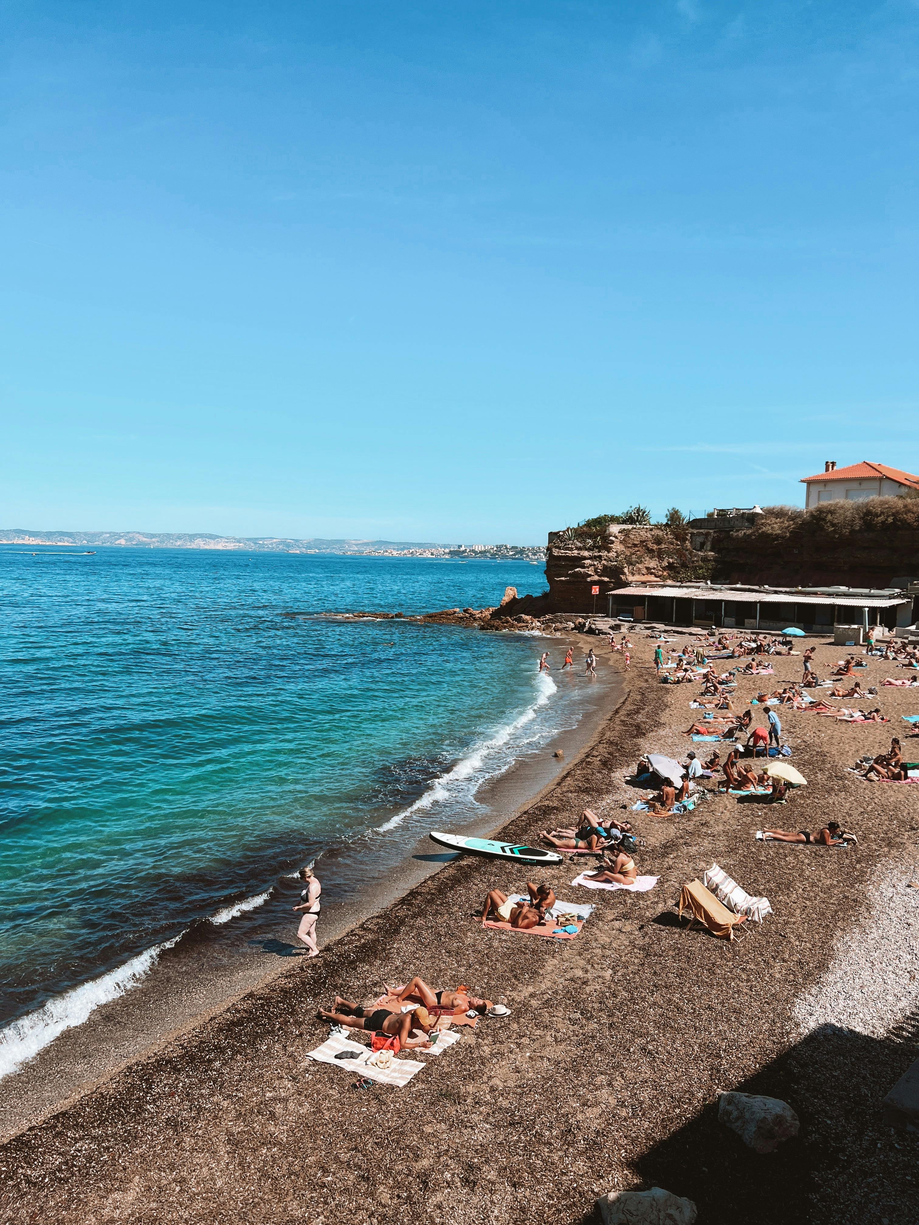 People Sunbathing on the Beach in Barcelona, Spain · Free Stock Photo