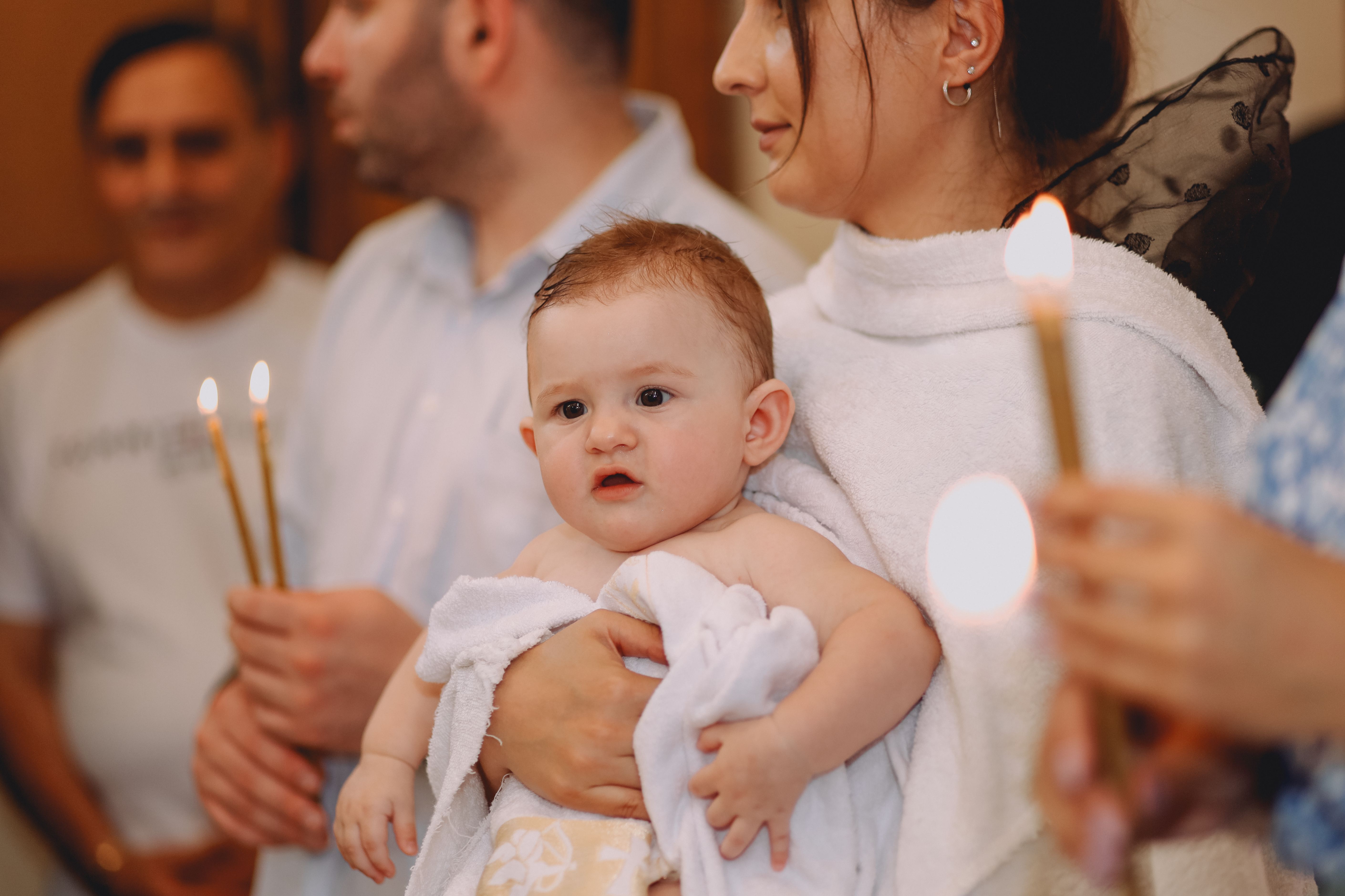 People Wearing White Shirts Getting Baptized in a Sea · Free Stock Photo