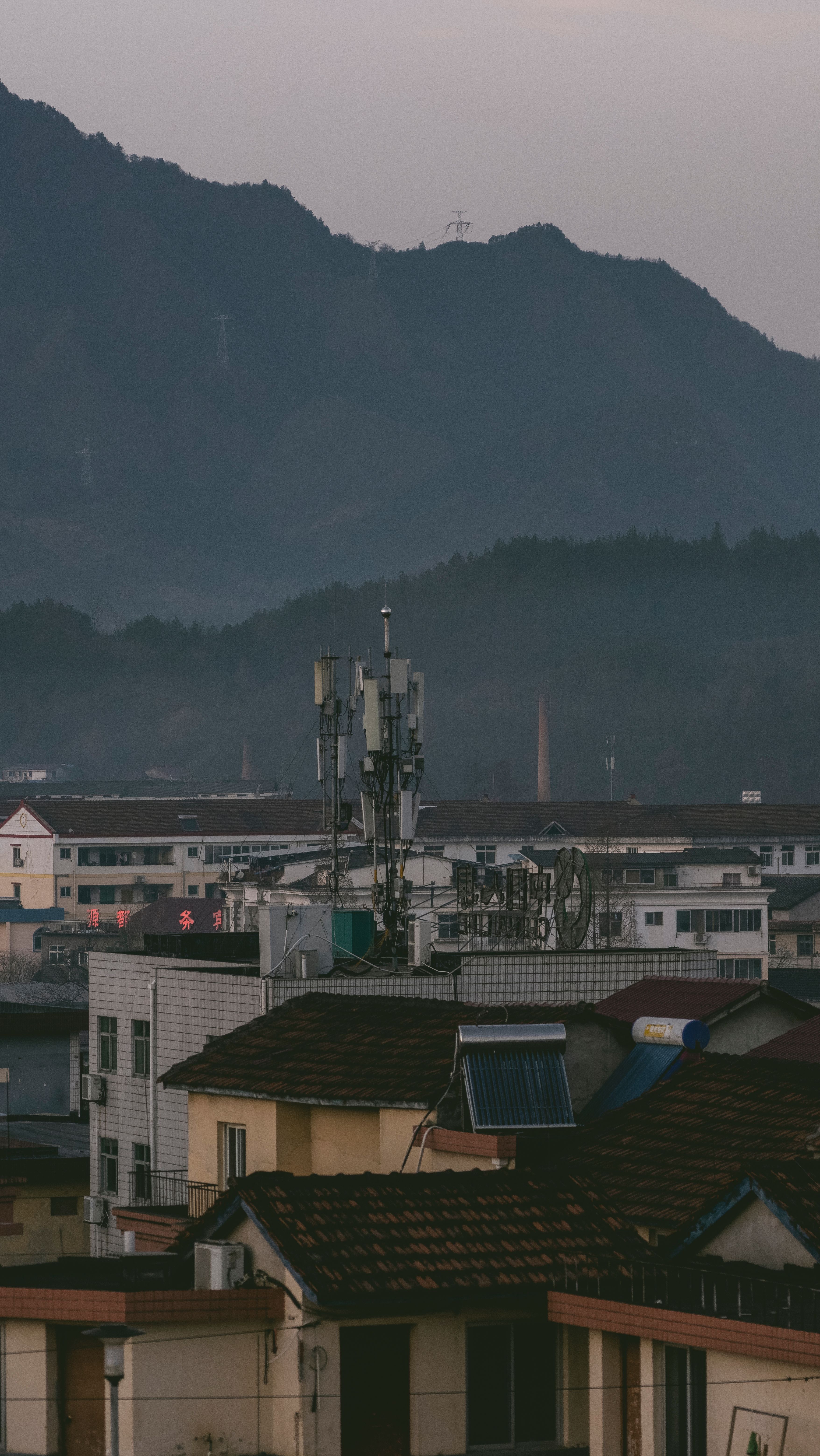 Telecommunication Tower on a Rooftop · Free Stock Photo