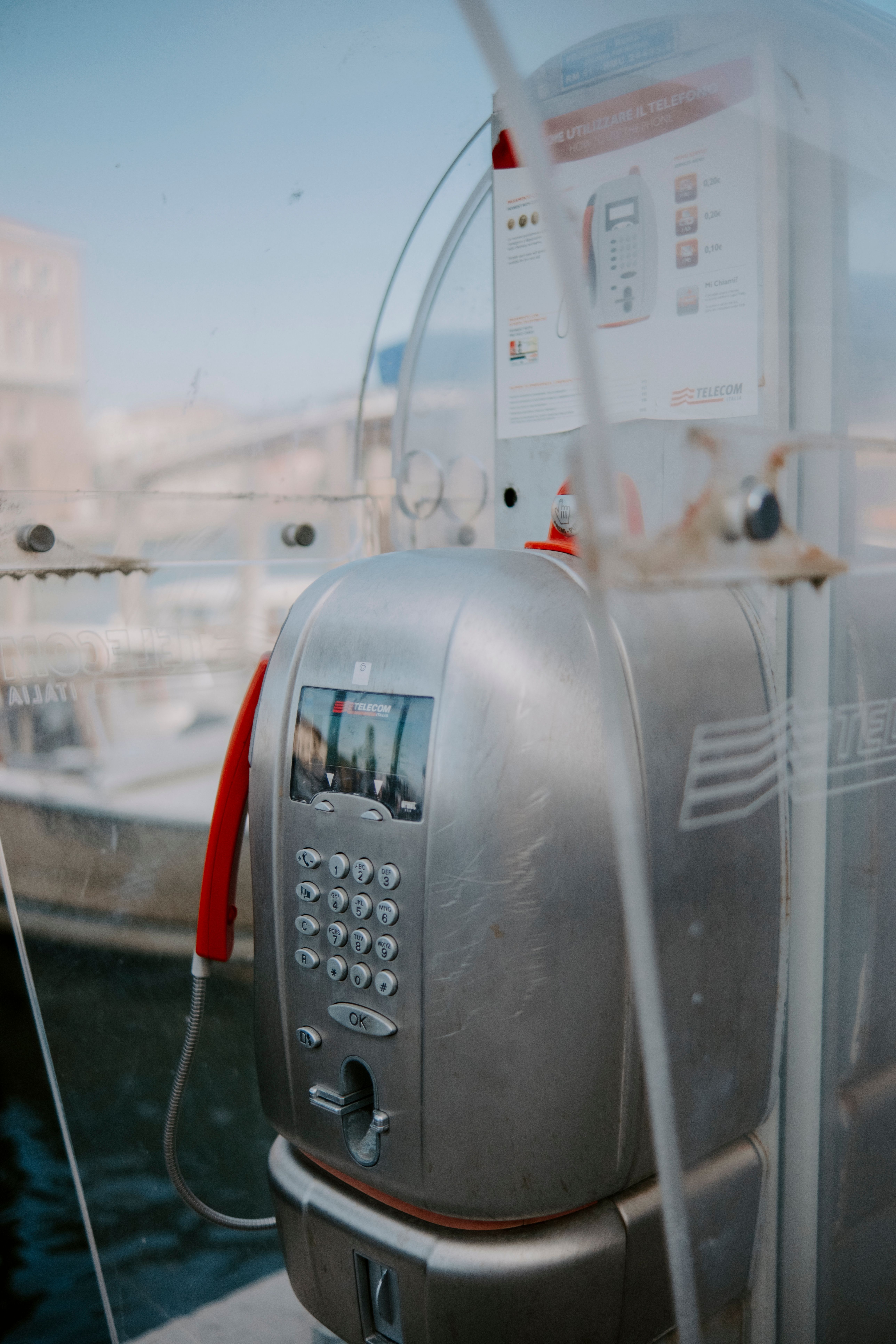 Street Pay Phone in a Plastic Booth, Venice, Italy · Free Stock Photo