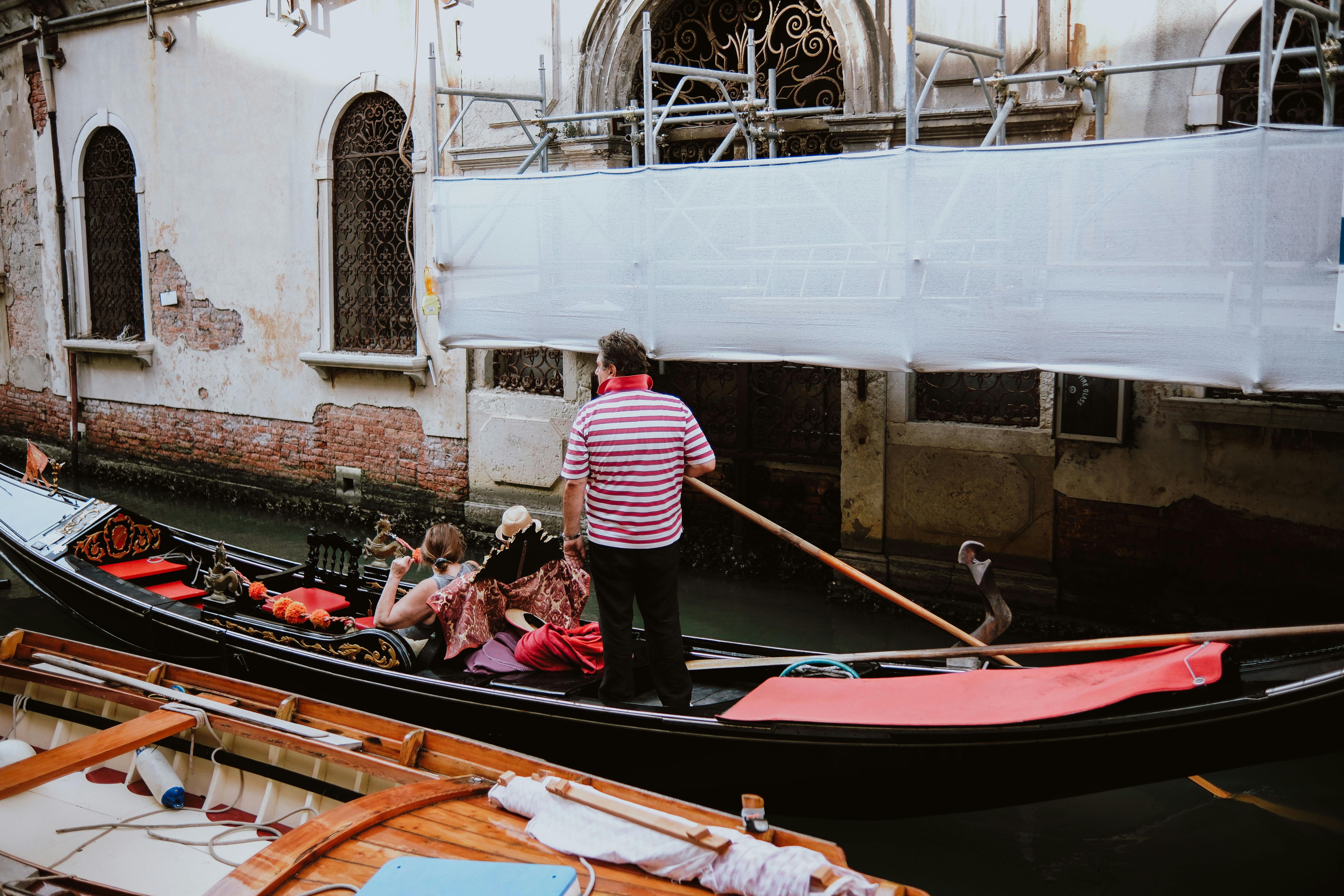 Tourists in a Gondola · Free Stock Photo