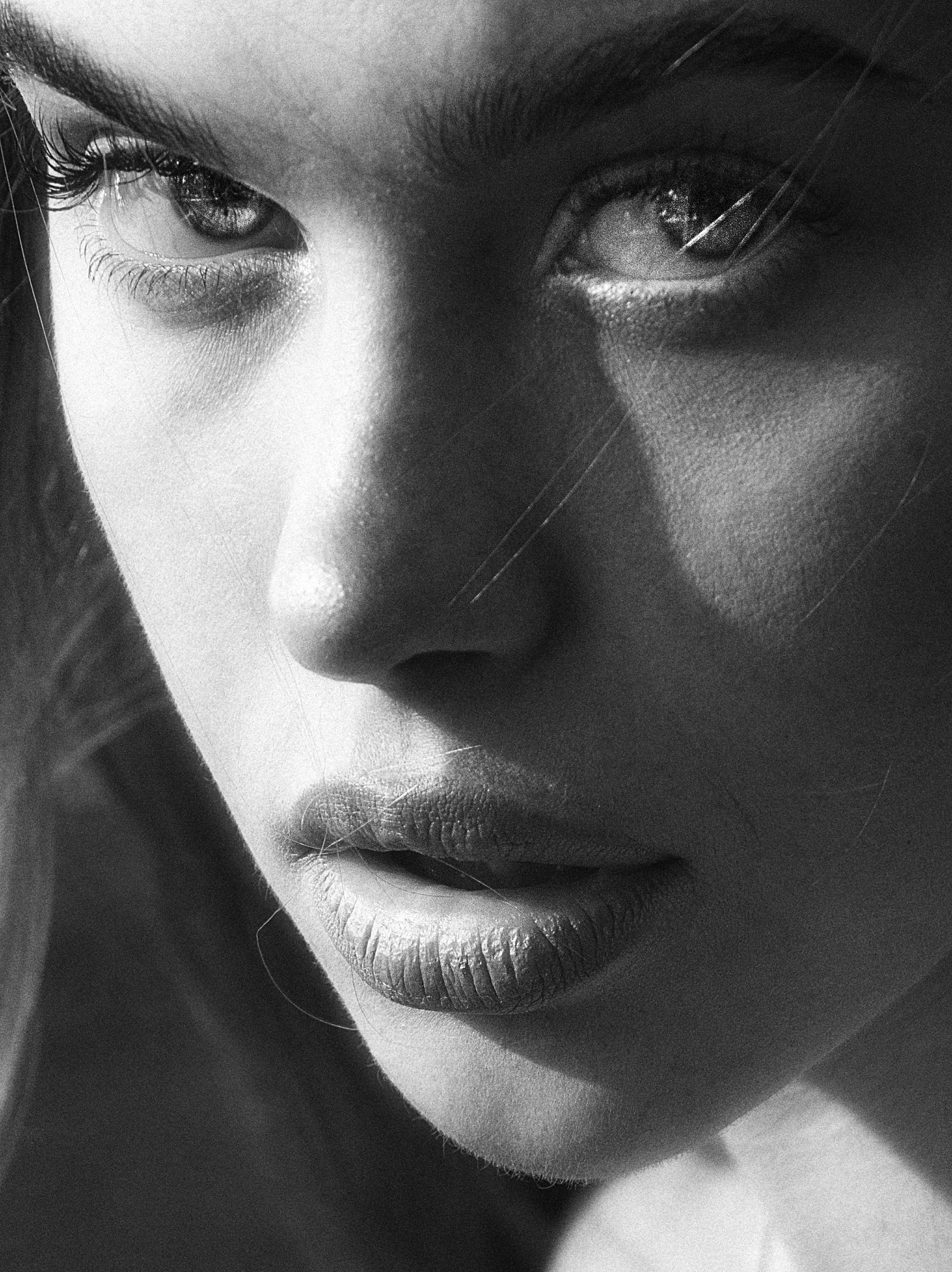 Grayscale Close-Up of a Womans Face · Free Stock Photo