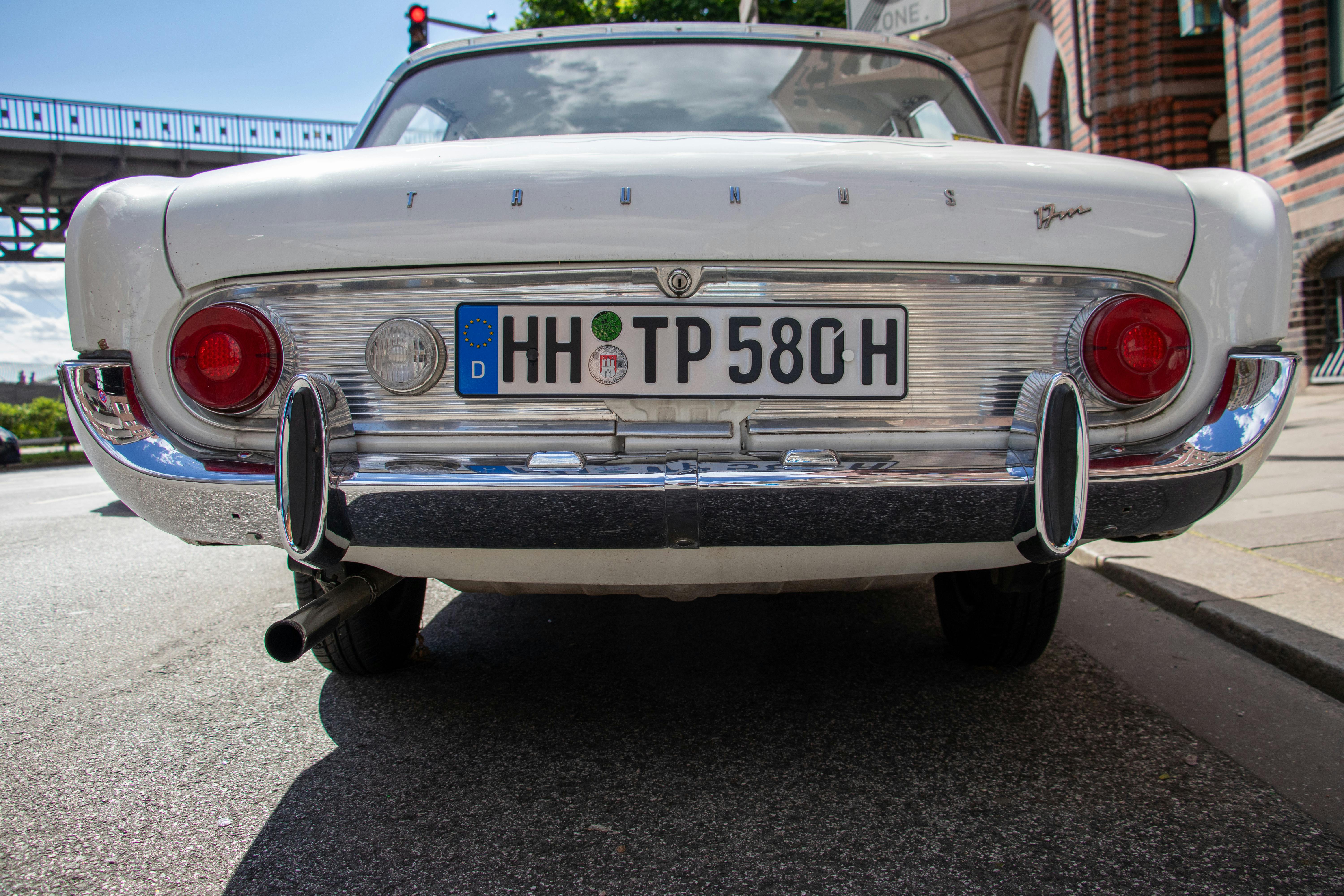 Rear View of a White Vintage Ford Taunus Car · Free Stock Photo