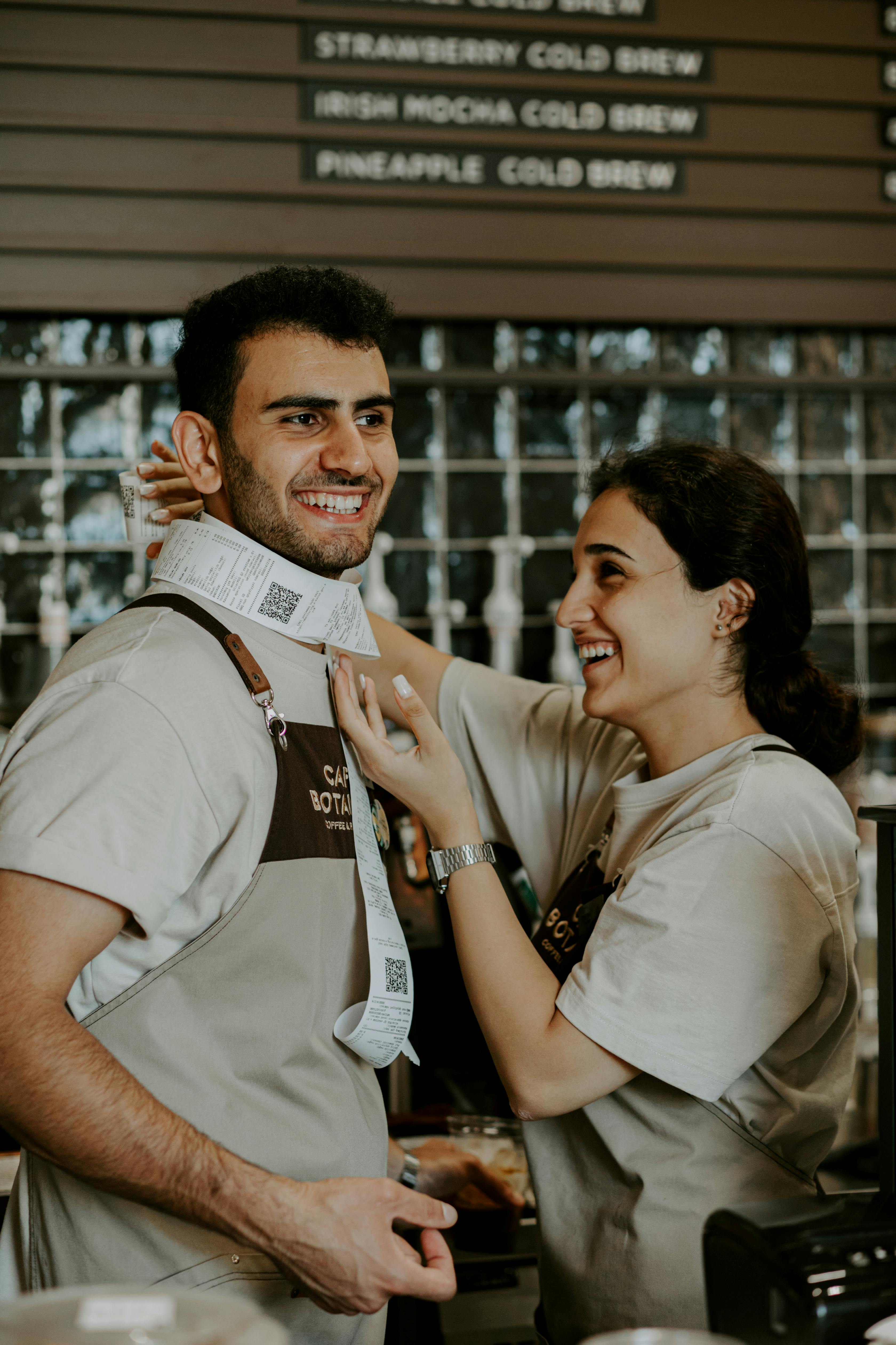Smiling Employees at Cafe · Free Stock Photo