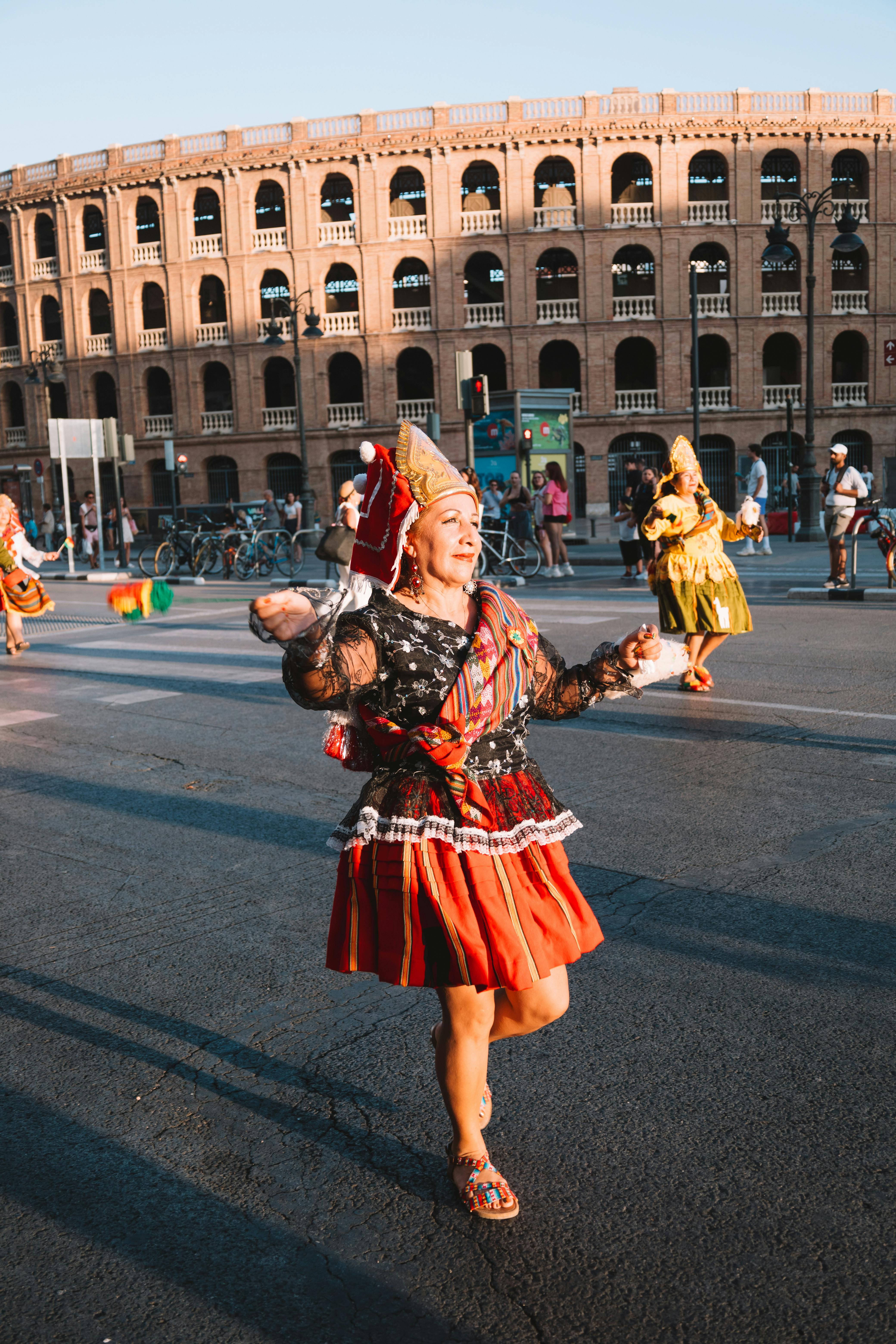 Woman in Traditional Dress on Parade on Street · Free Stock Photo