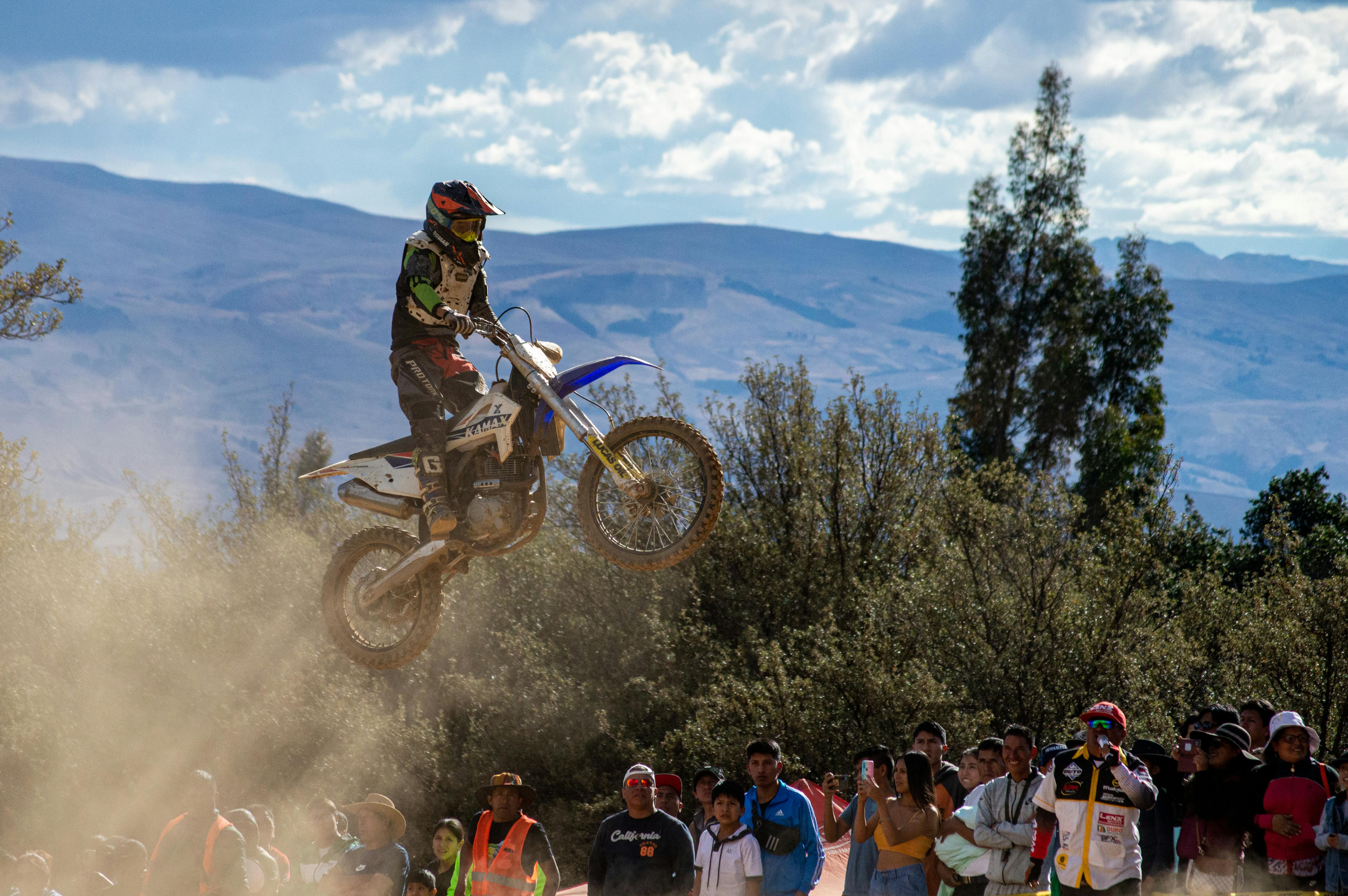 Man Jumping on a Motocross During a Competition · Free Stock Photo