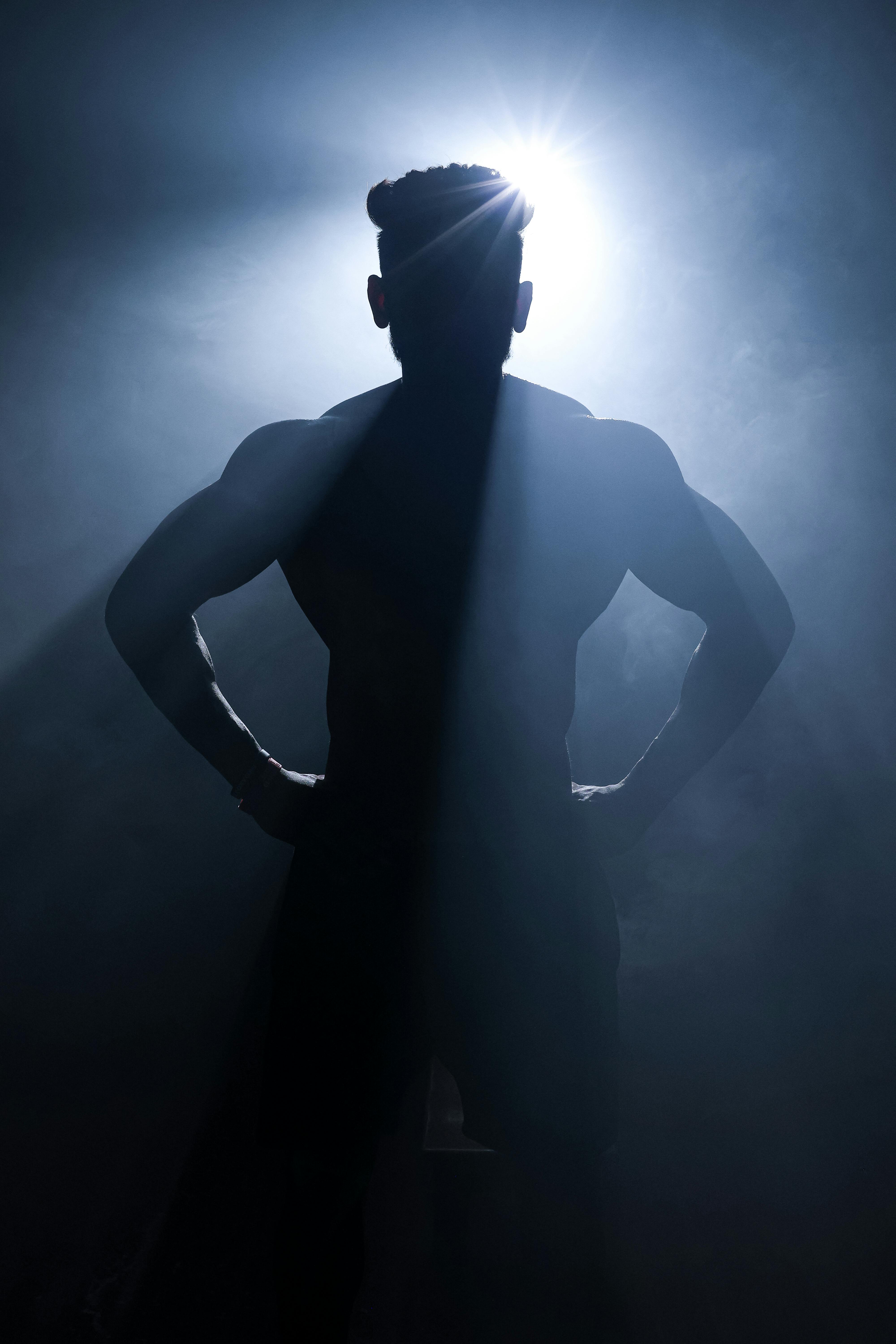 Dark Photo of a Muscular Man · Free Stock Photo