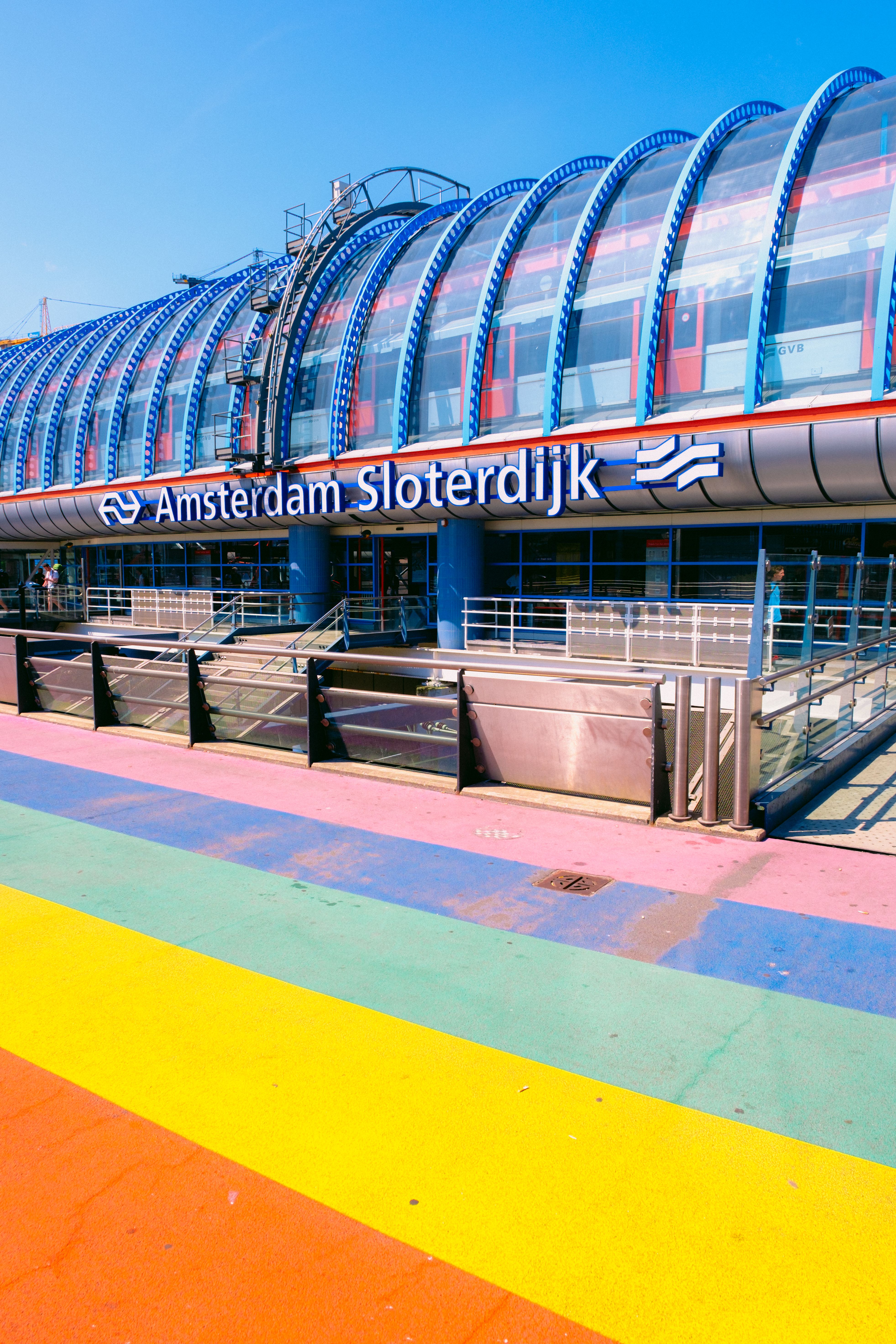 A Rainbow Pavement in front of the Amsterdam Sloterdijk Station · Free ...