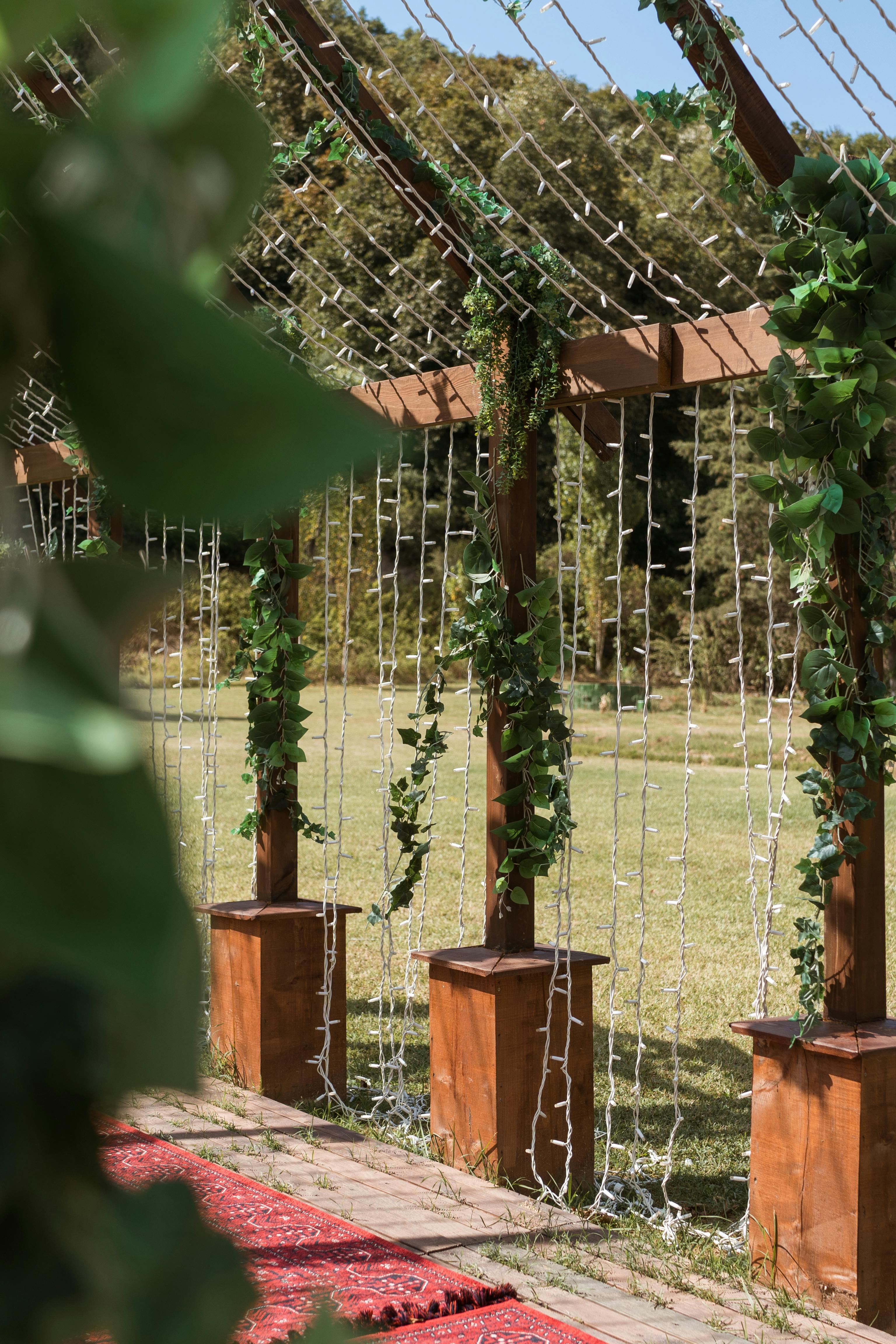 Wedding Pavilion Arch Decorated with Artificial Plants and LED Strips ...