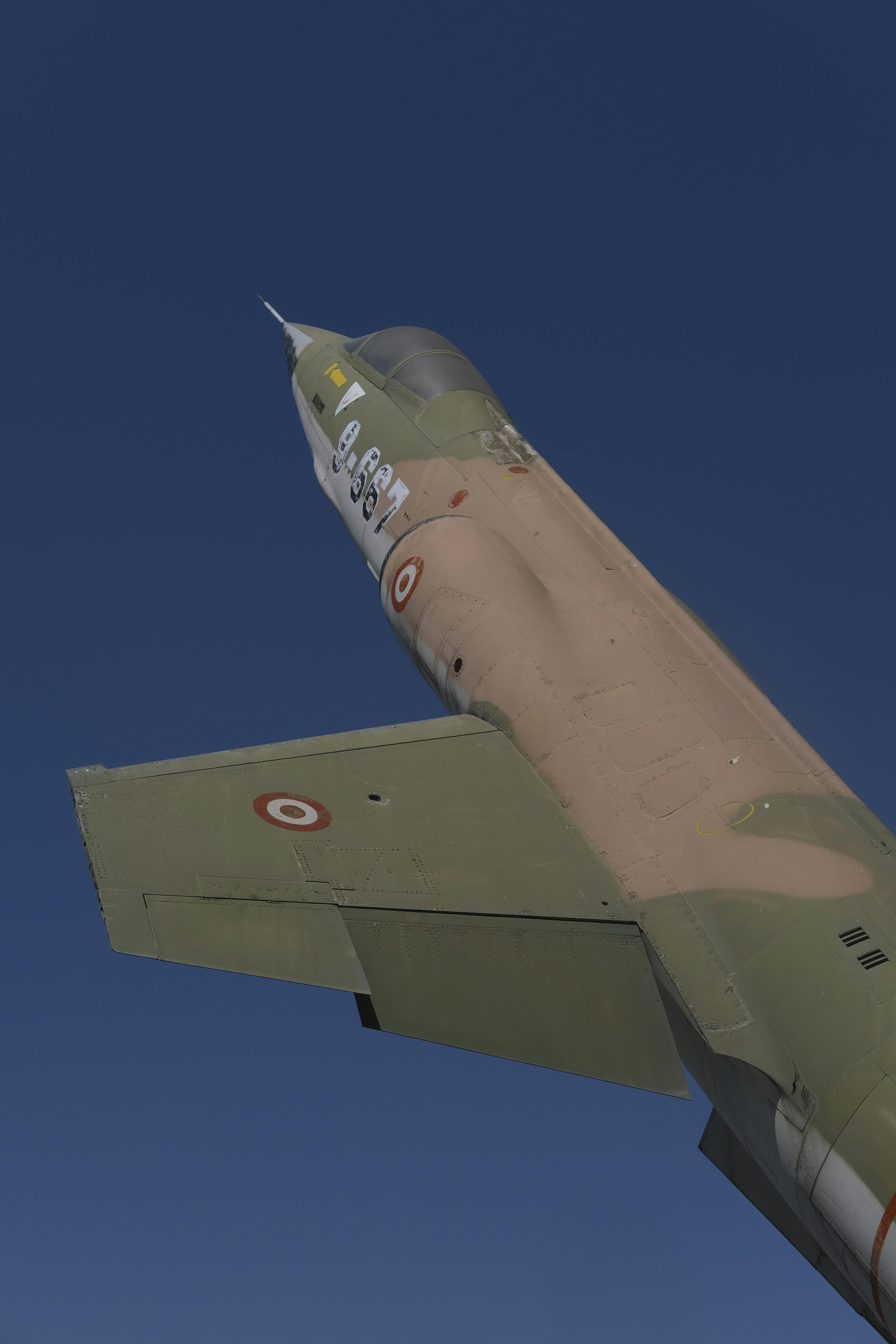 Military Plane Flying in Blue Sky · Free Stock Photo