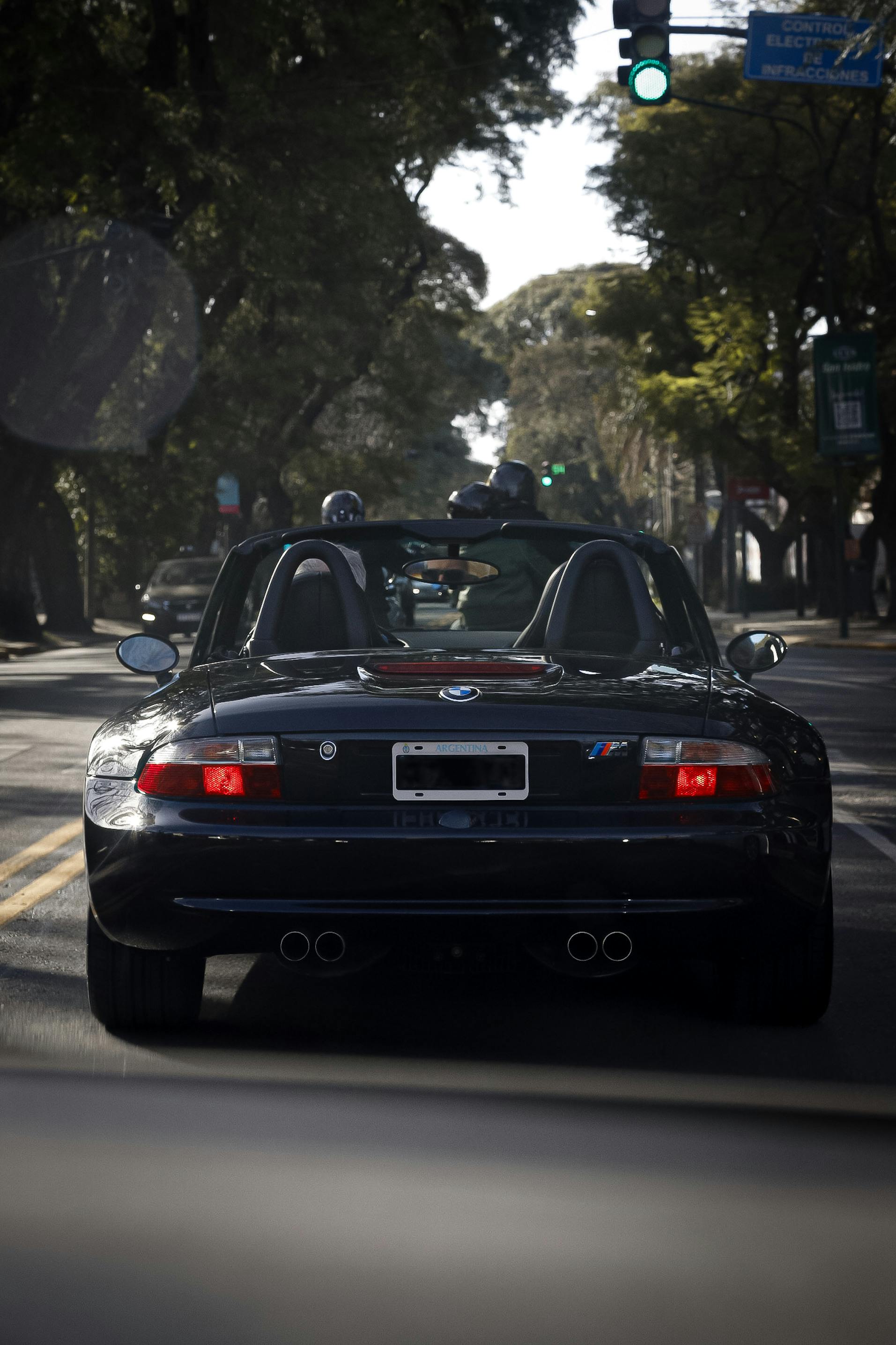 Back View of a BMW Z3 on a Street · Free Stock Photo