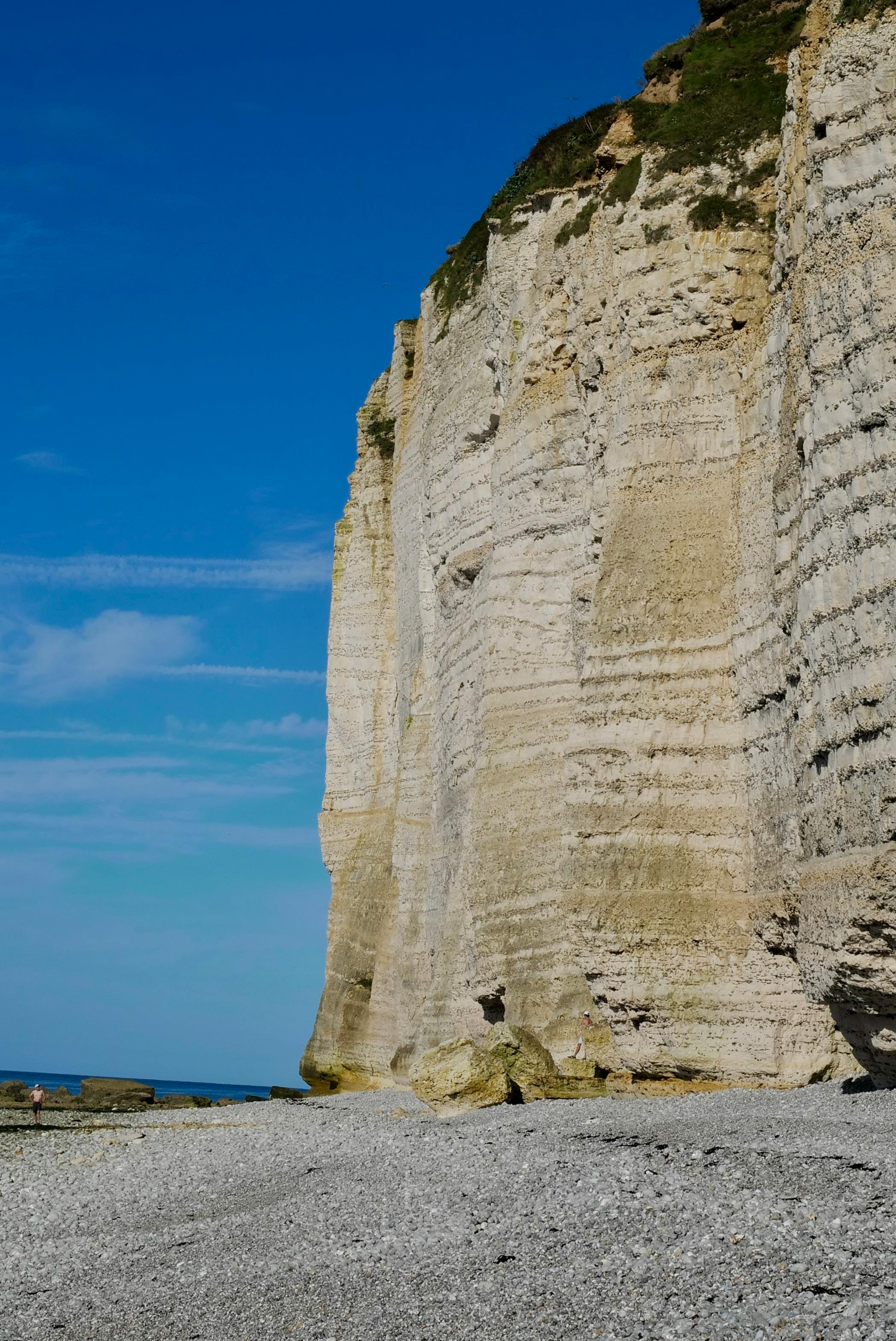 Rocks at the Bottom of a Limestone Cliff · Free Stock Photo