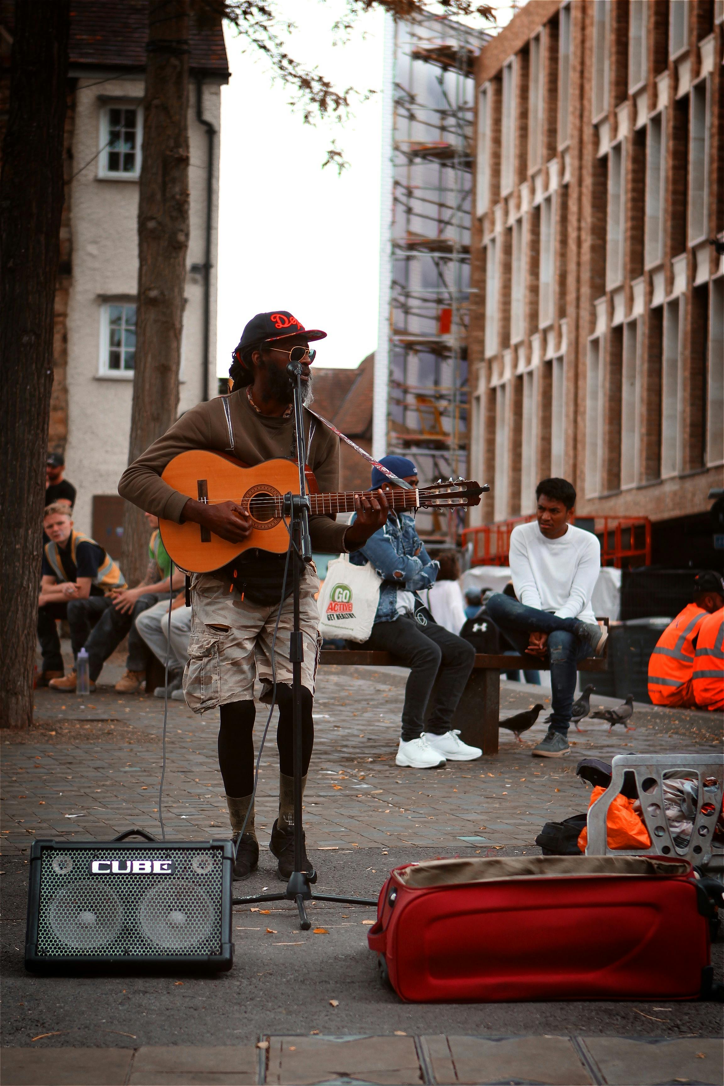 Street Musician on Sidewalk in Oxford, England · Free Stock Photo
