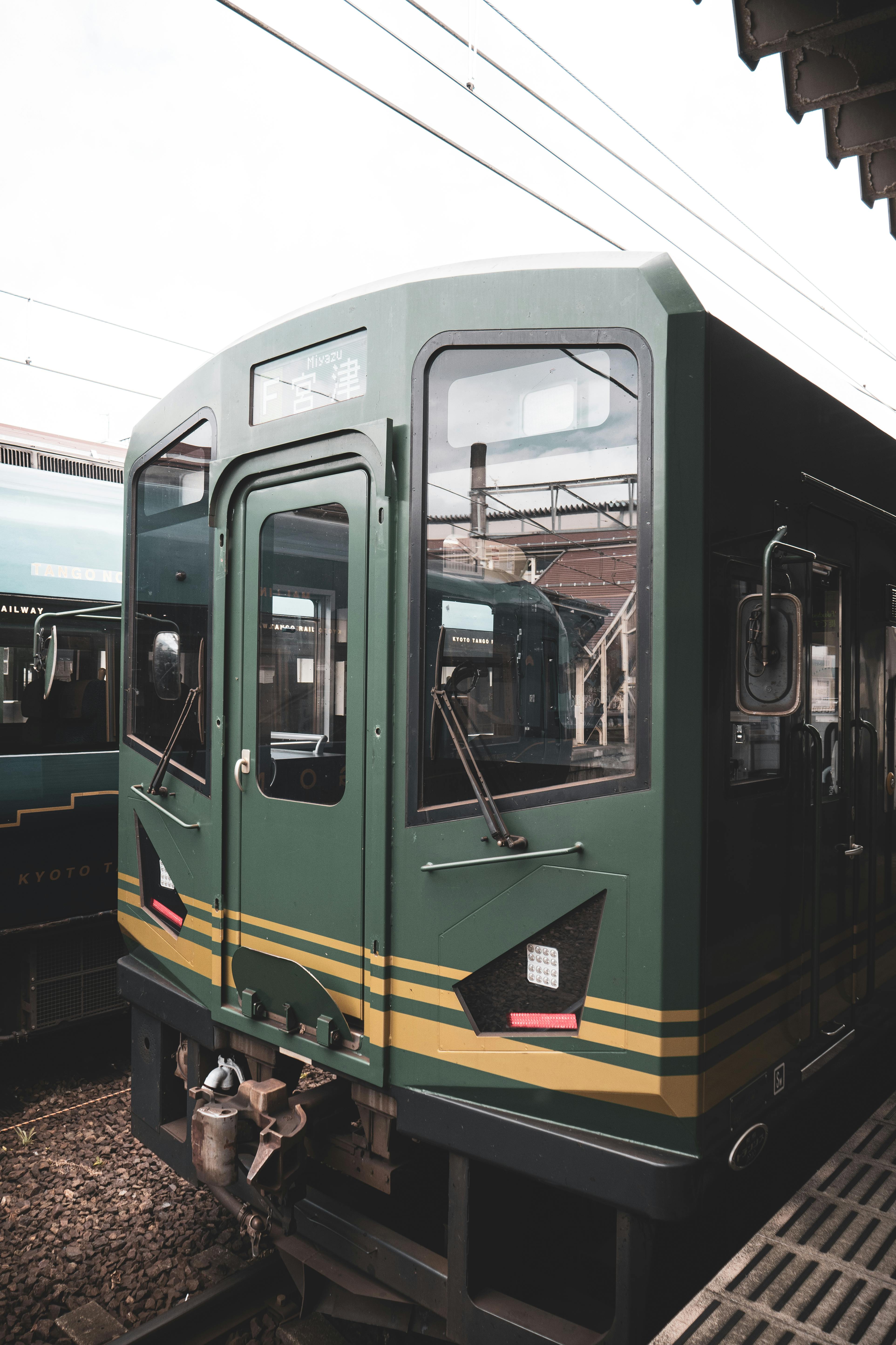 Old Train Standing by a Platform · Free Stock Photo