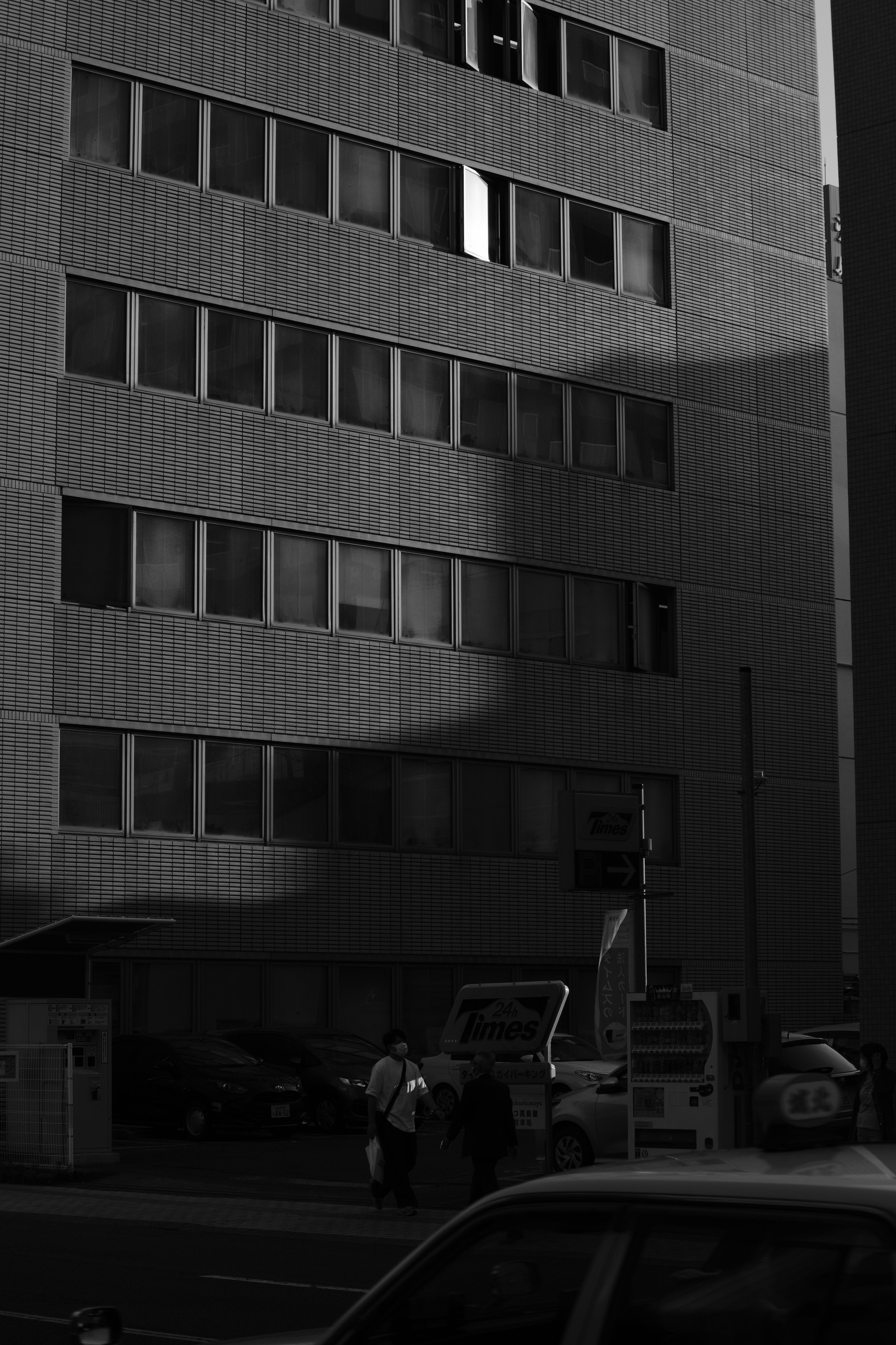Parking Lot outside a Building at Dusk · Free Stock Photo