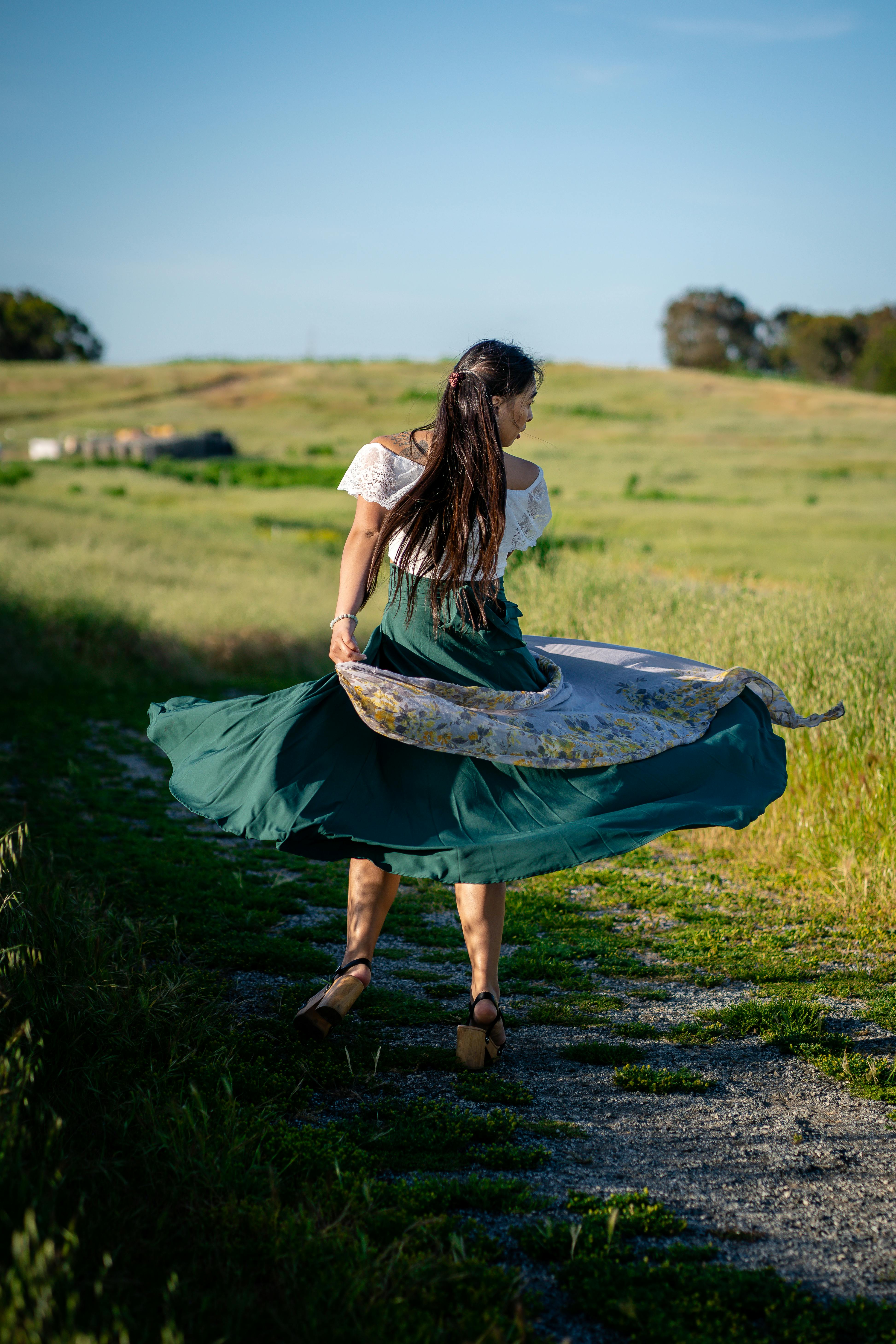 Woman in Traditional Dress in Countryside · Free Stock Photo