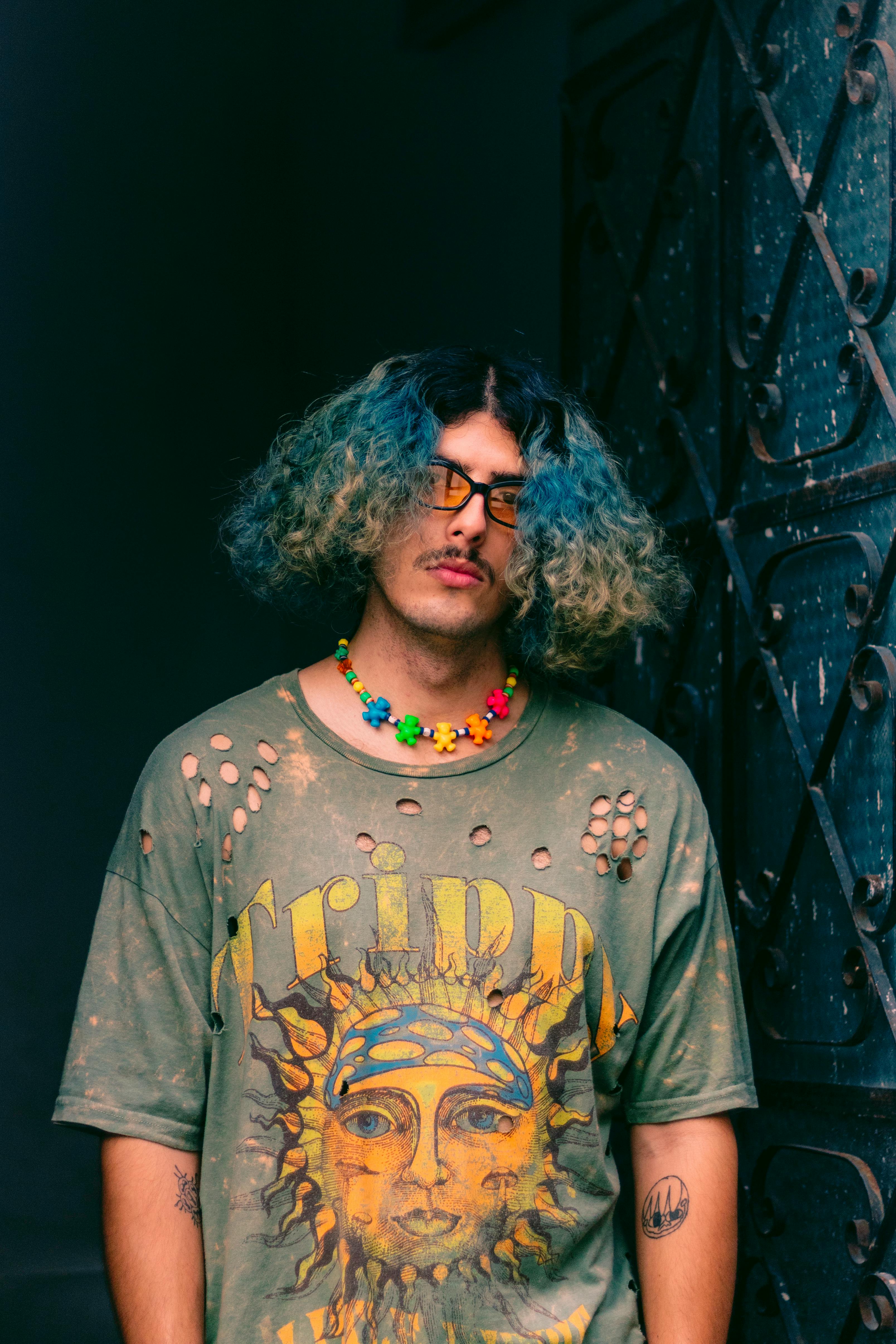 Man Posing in T-shirt · Free Stock Photo