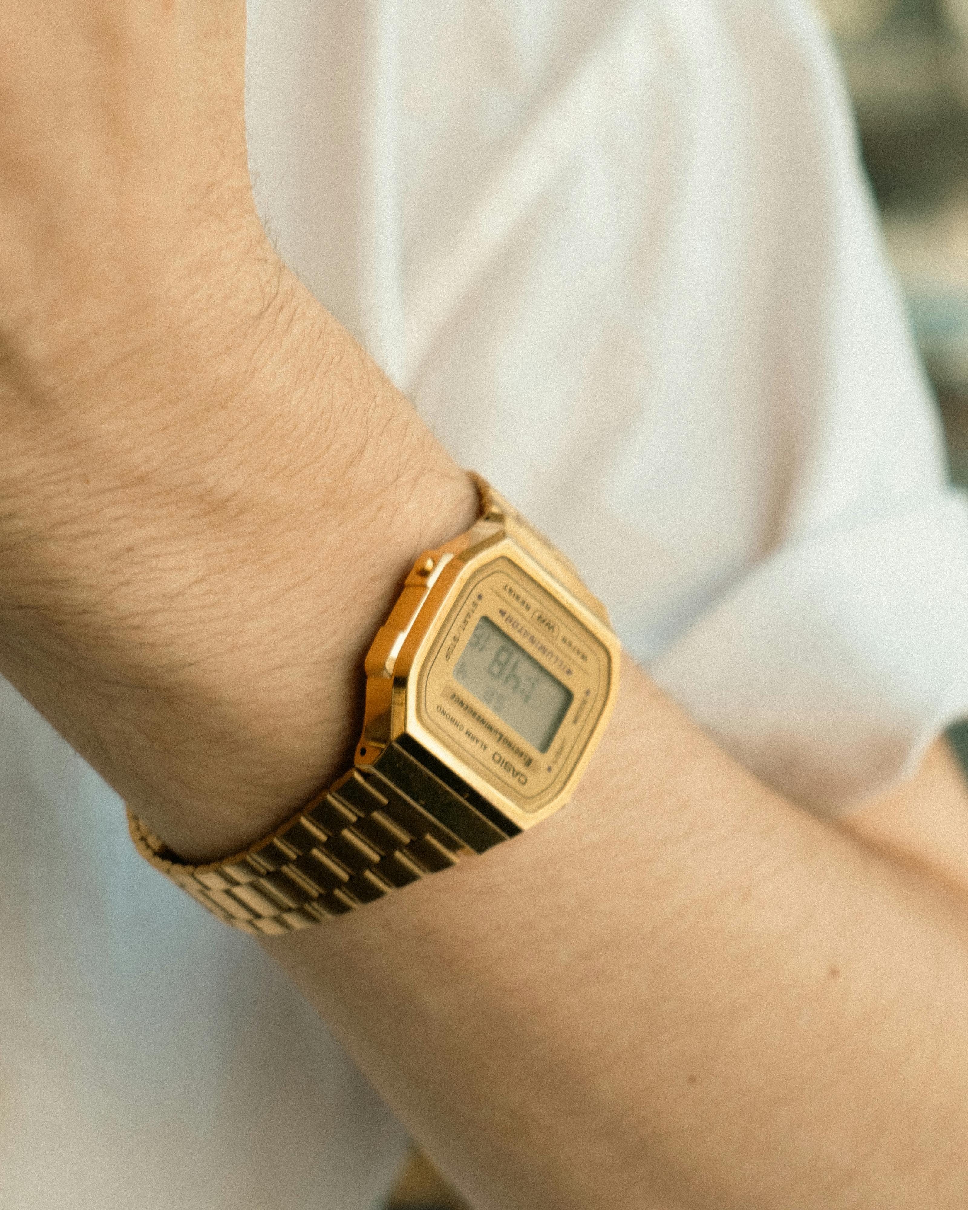 Arm of a Person Wearing a Digital Wristwatch · Free Stock Photo