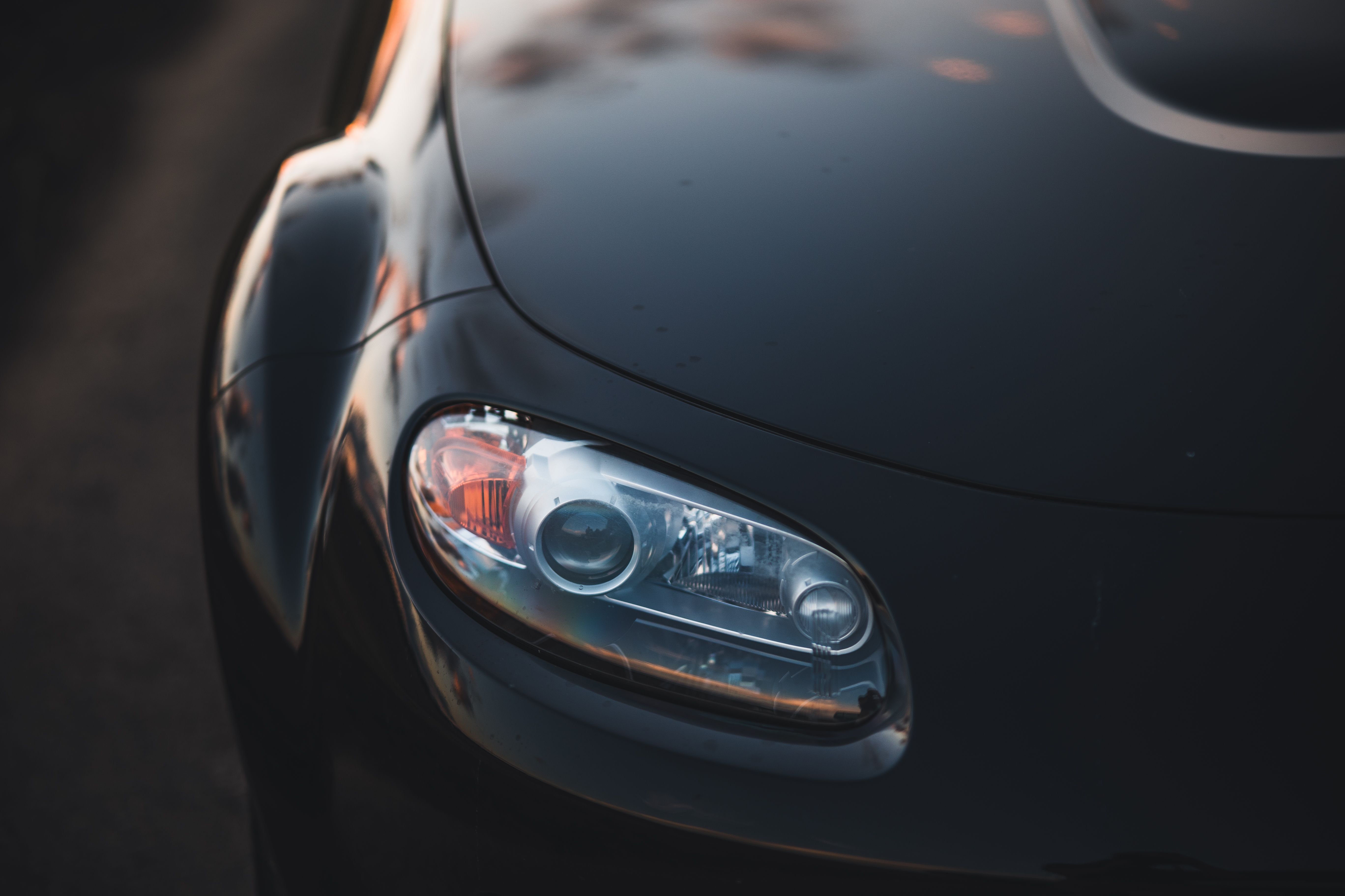 Close-up of the Headlight of a Modern Black Mazda MX-5 · Free Stock Photo