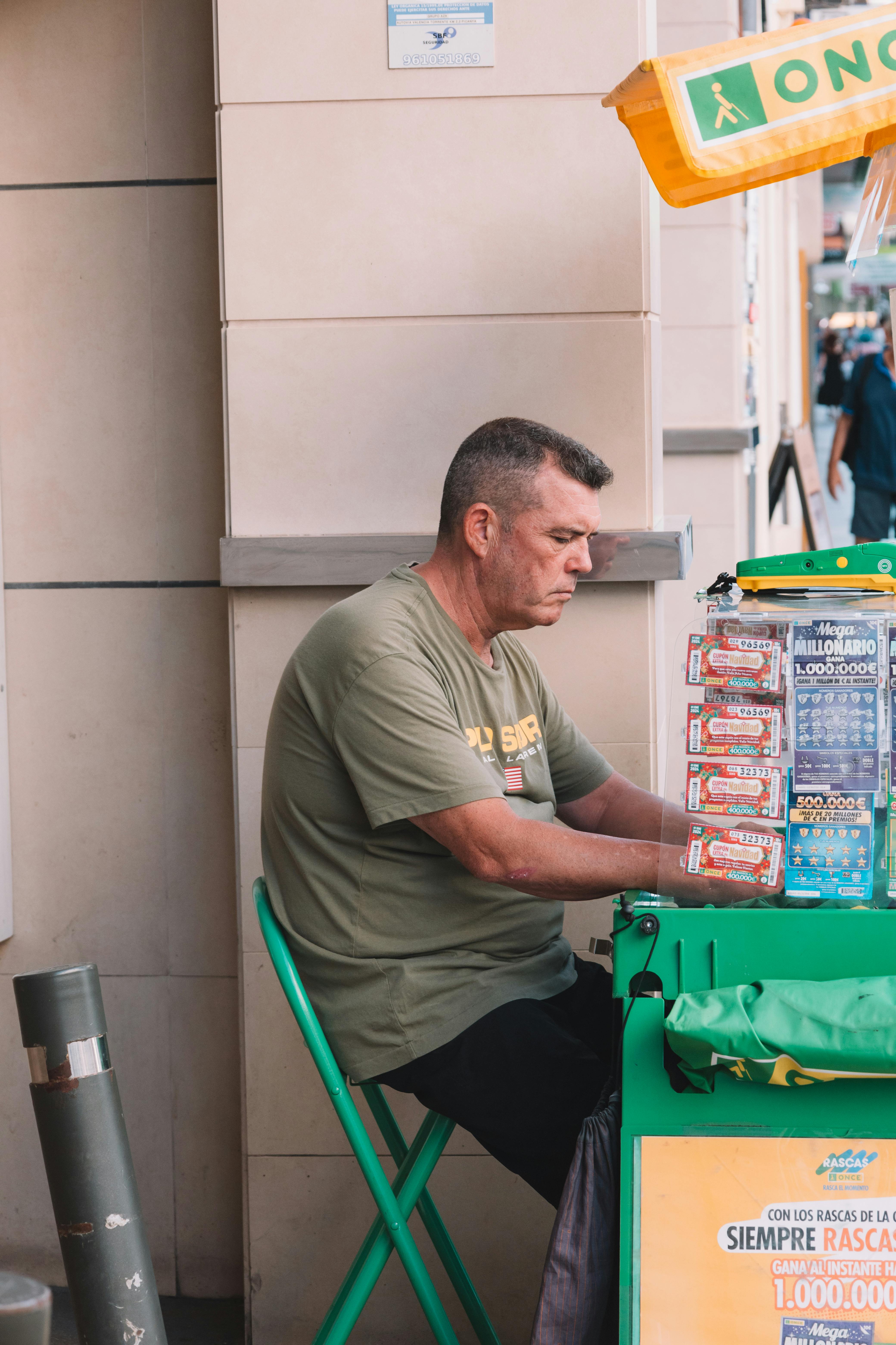 Man Selling Items on the Street · Free Stock Photo