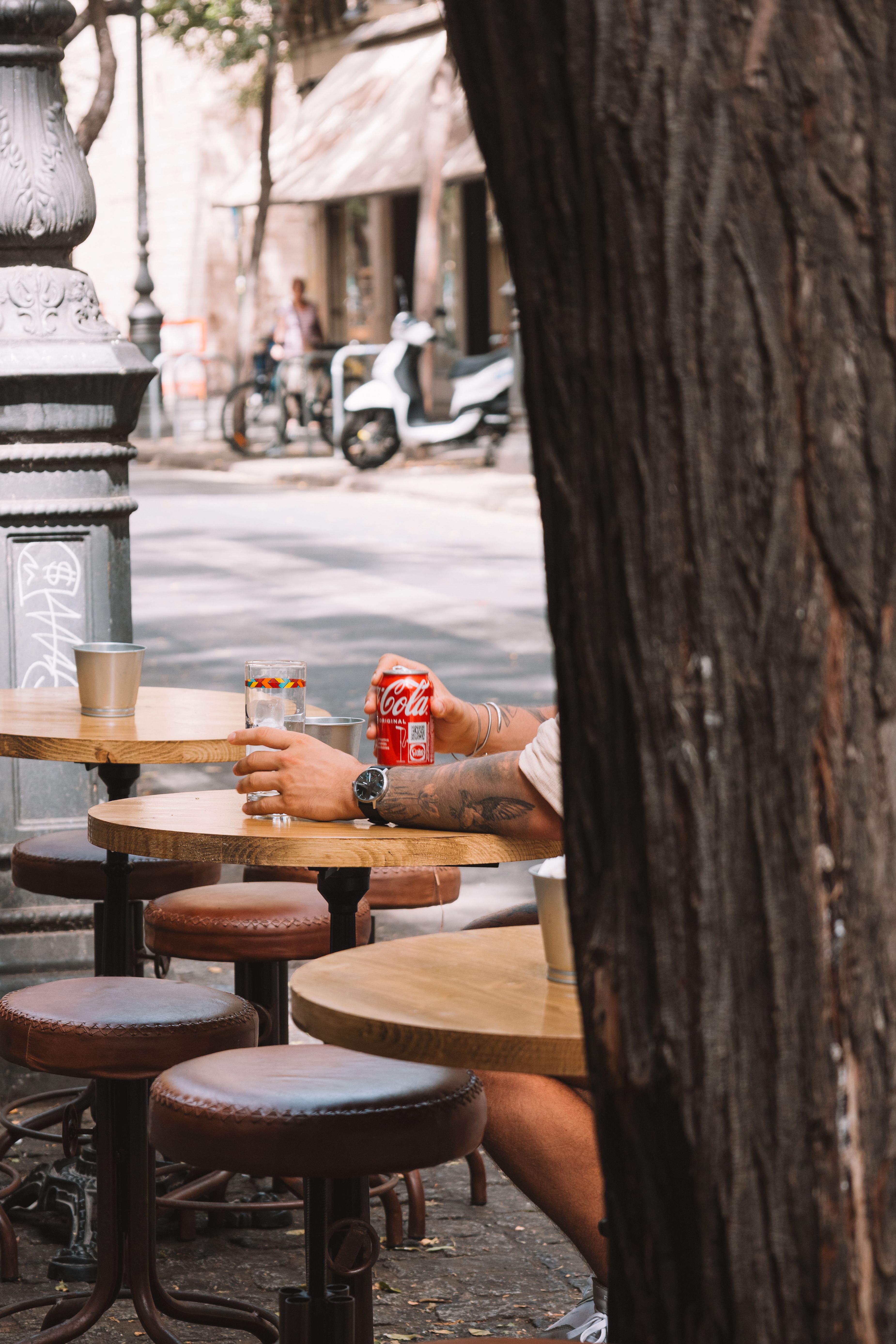 Man Drinking Coke by the Street · Free Stock Photo
