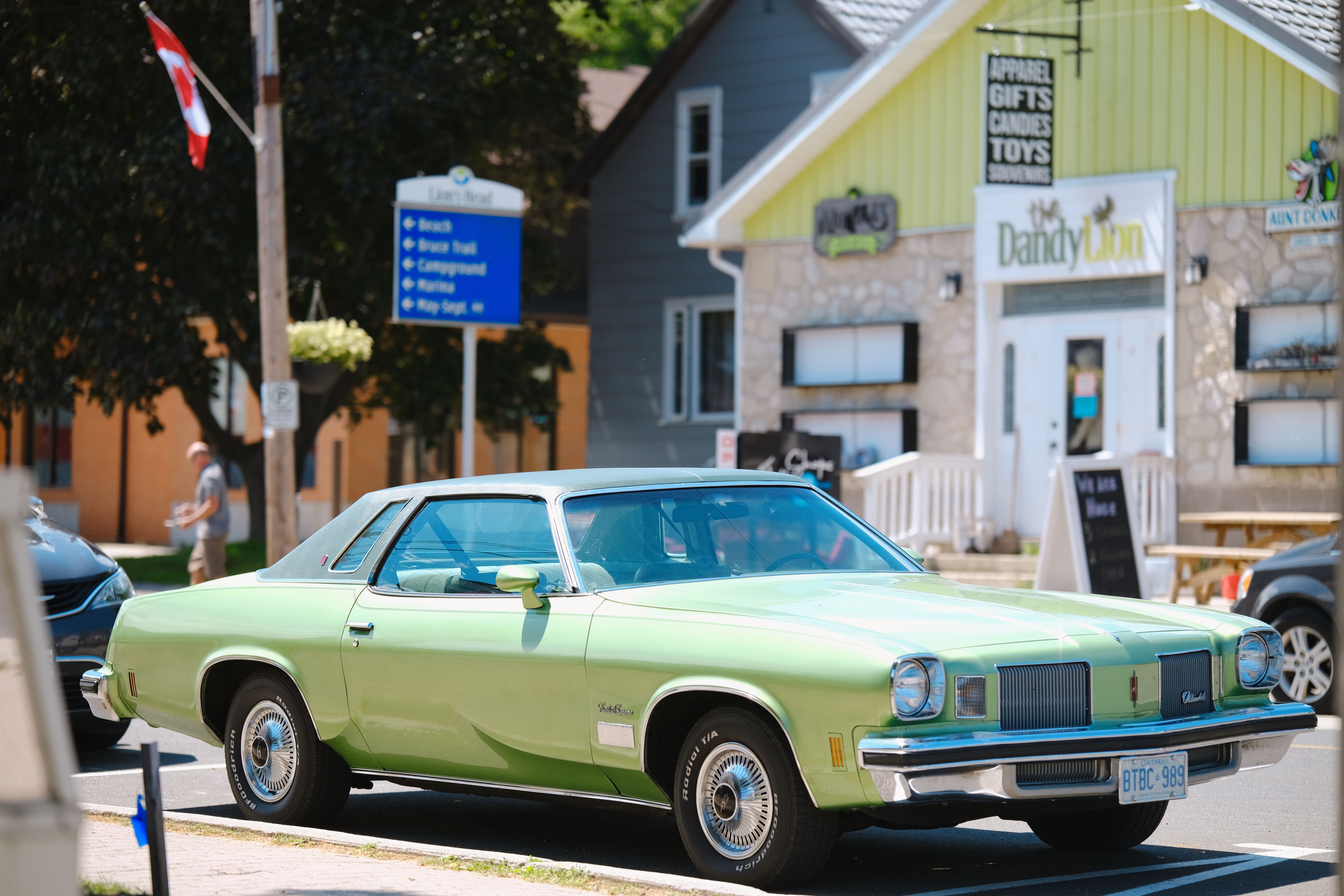Green Classic Car on the Street · Free Stock Photo
