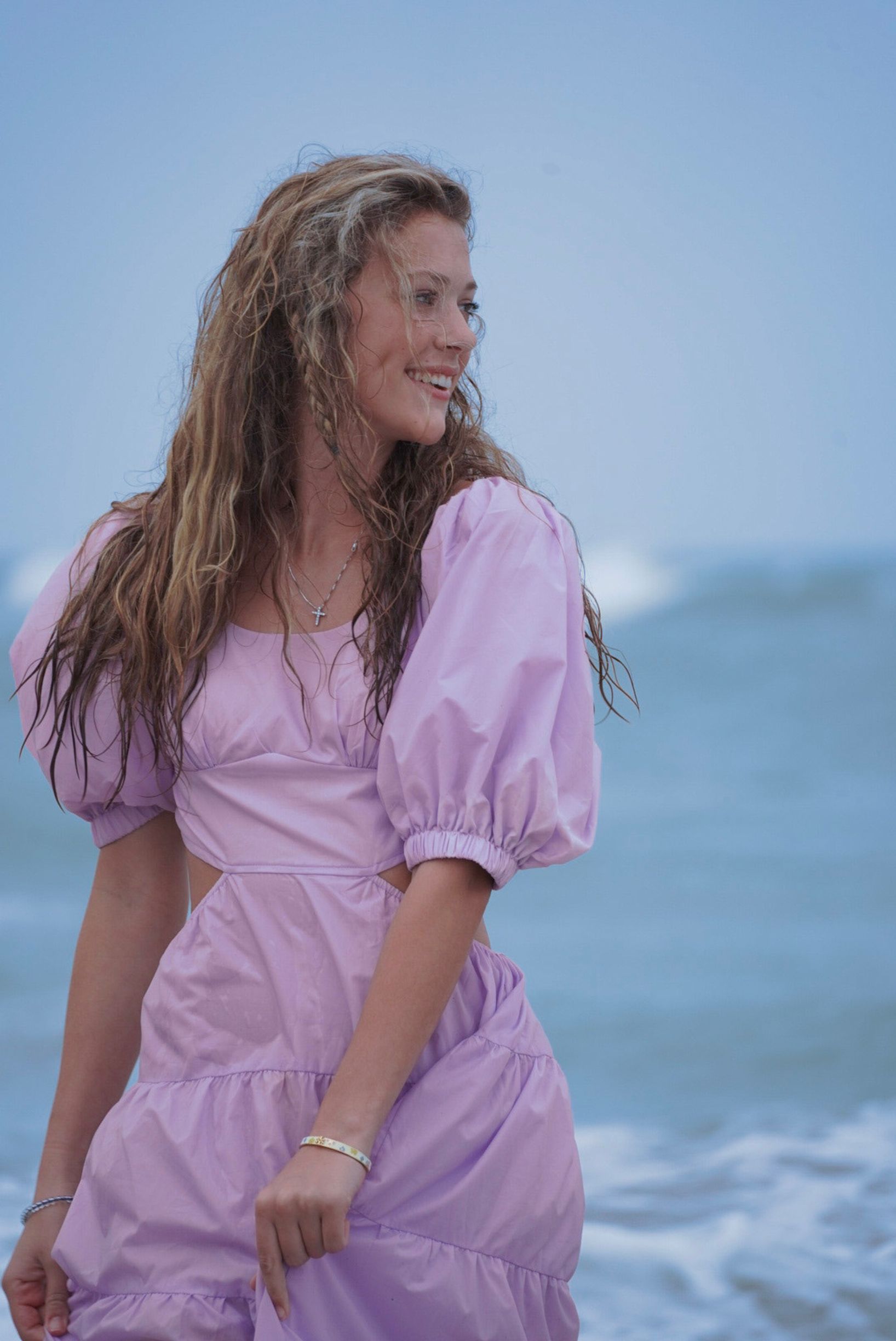 Smiling Woman in Purple Dress on Vacation · Free Stock Photo