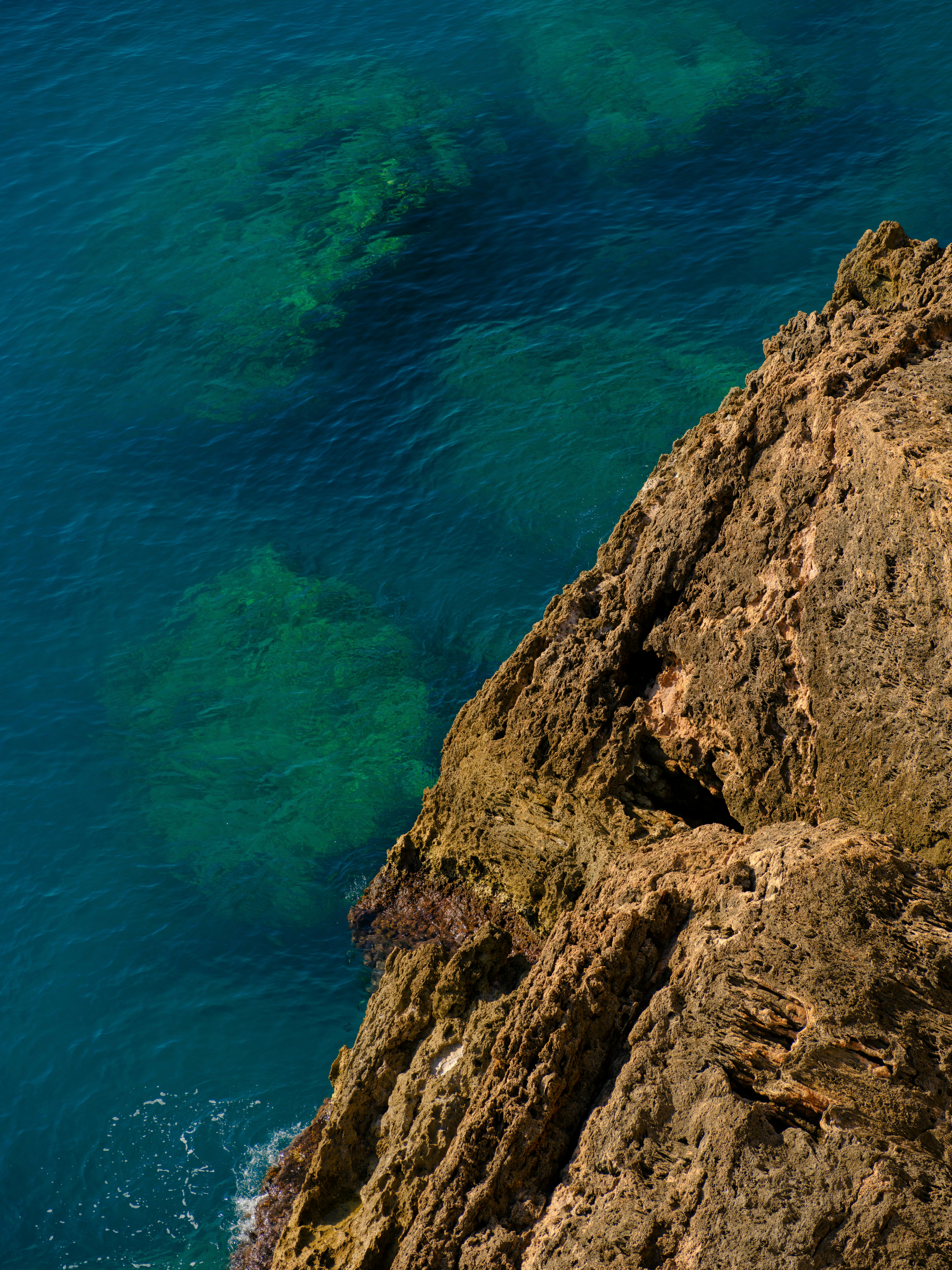 Rock near Blue Ocean Water · Free Stock Photo