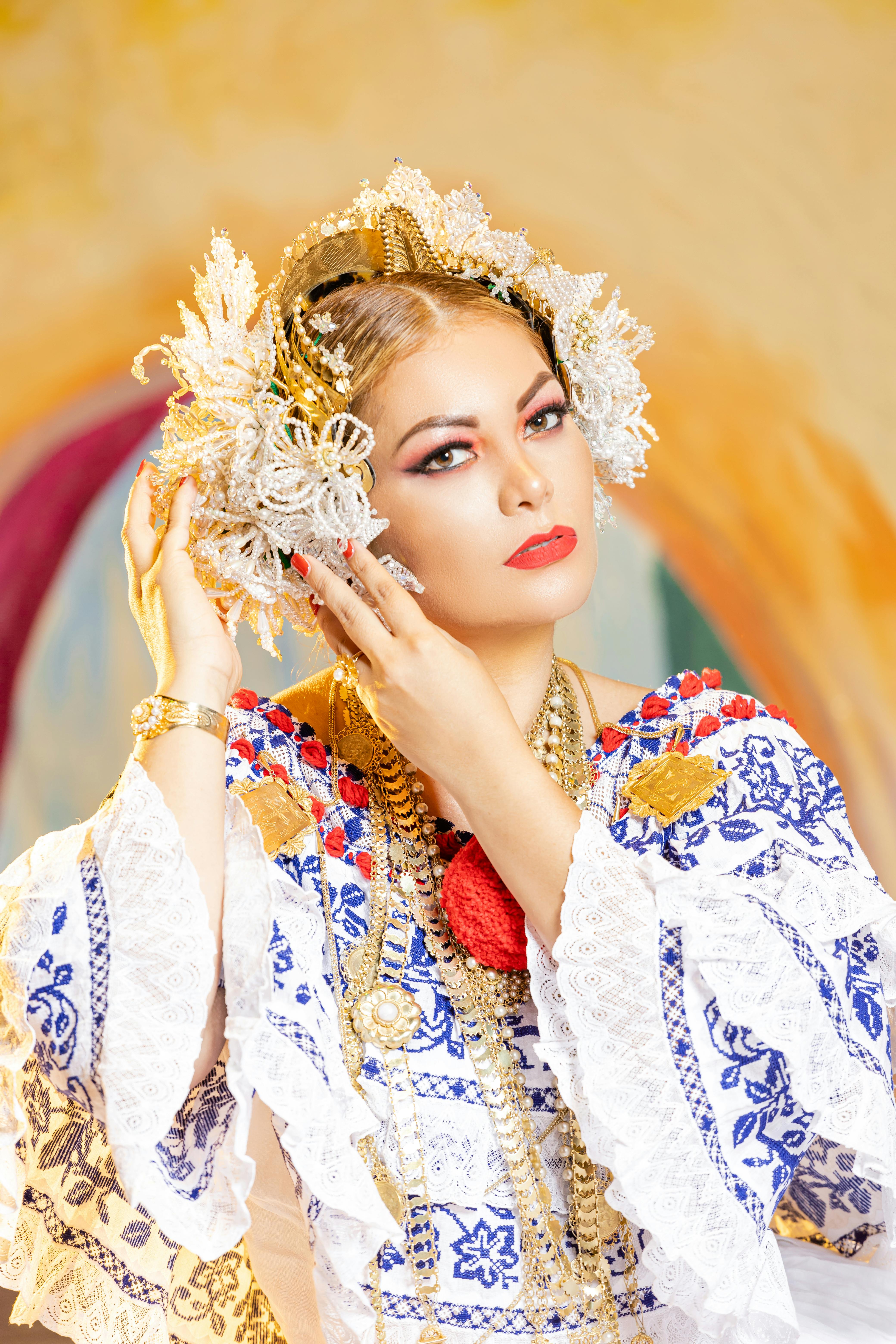 Woman in Traditional, Decorated Clothing · Free Stock Photo