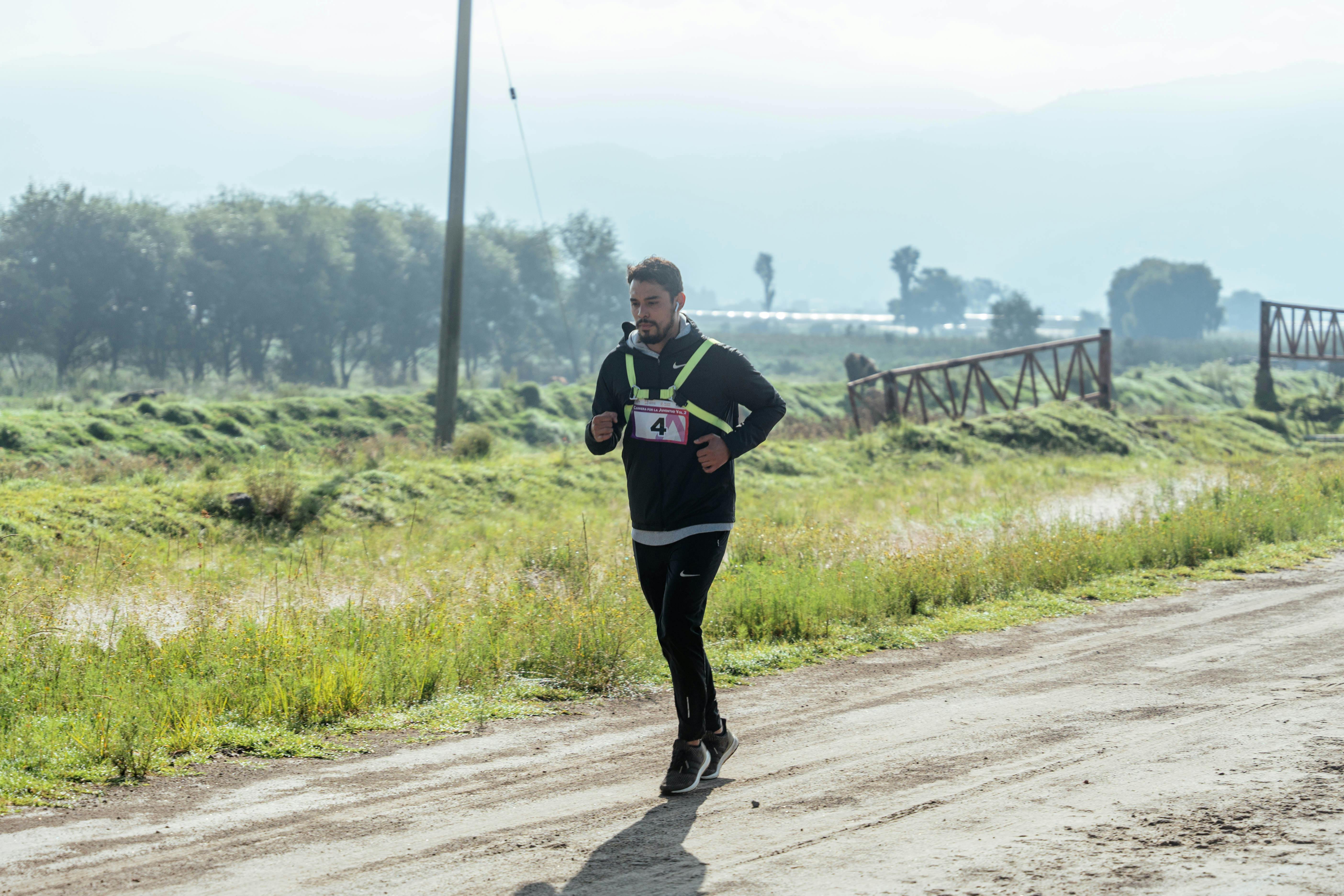 Photo Of Man Running During Daytime · Free Stock Photo
