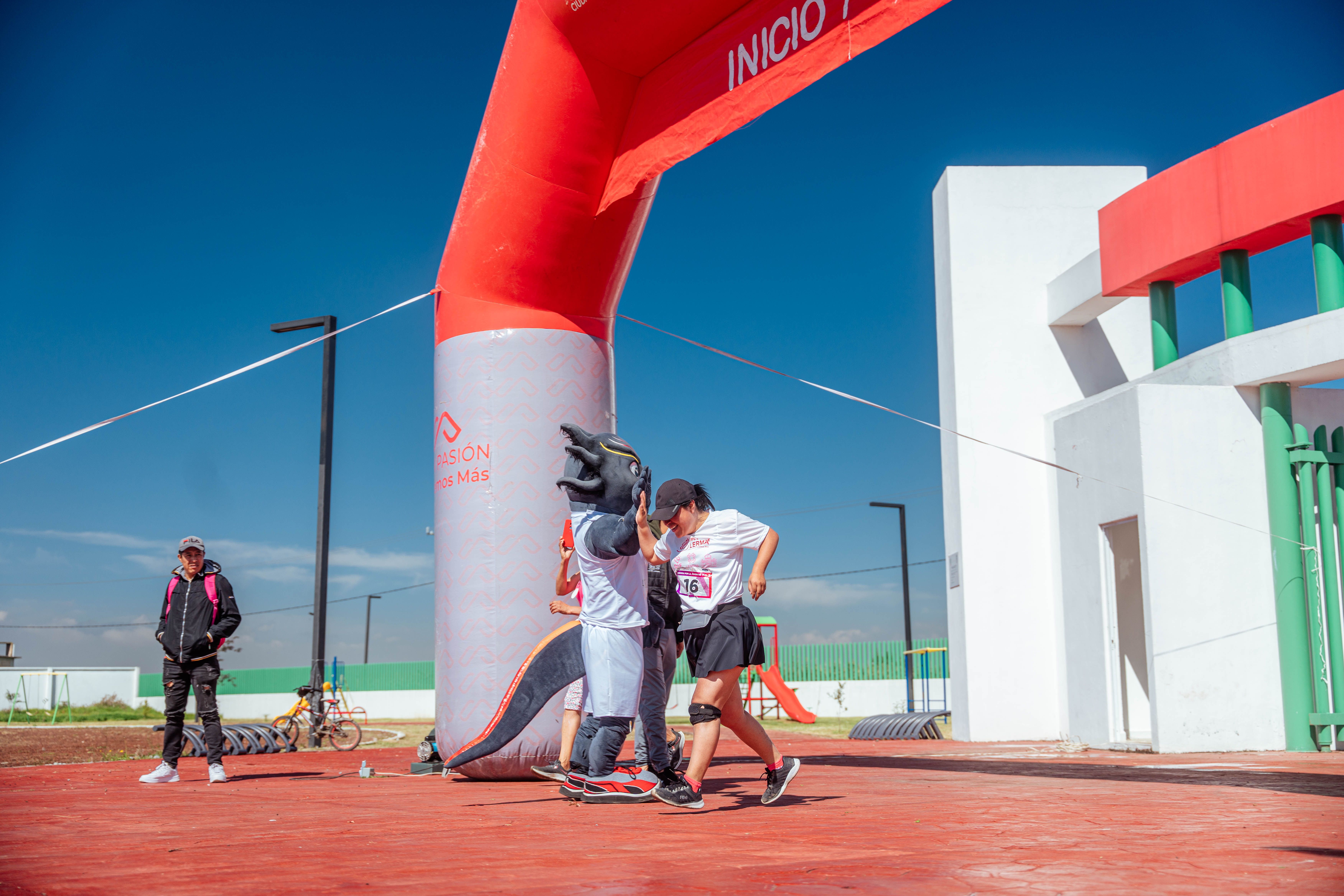 Woman Passing Finish Line · Free Stock Photo