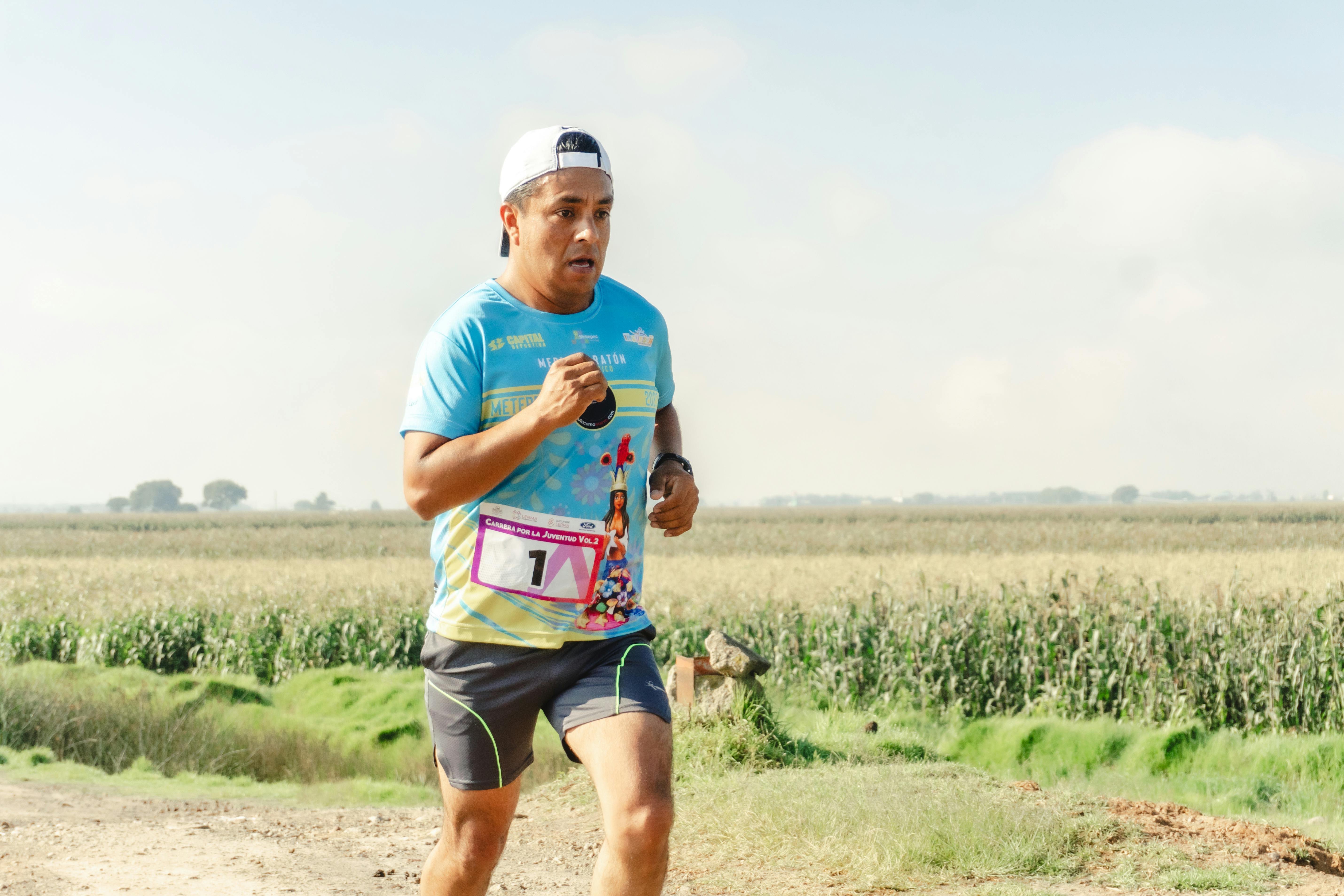 Man Running in Race · Free Stock Photo