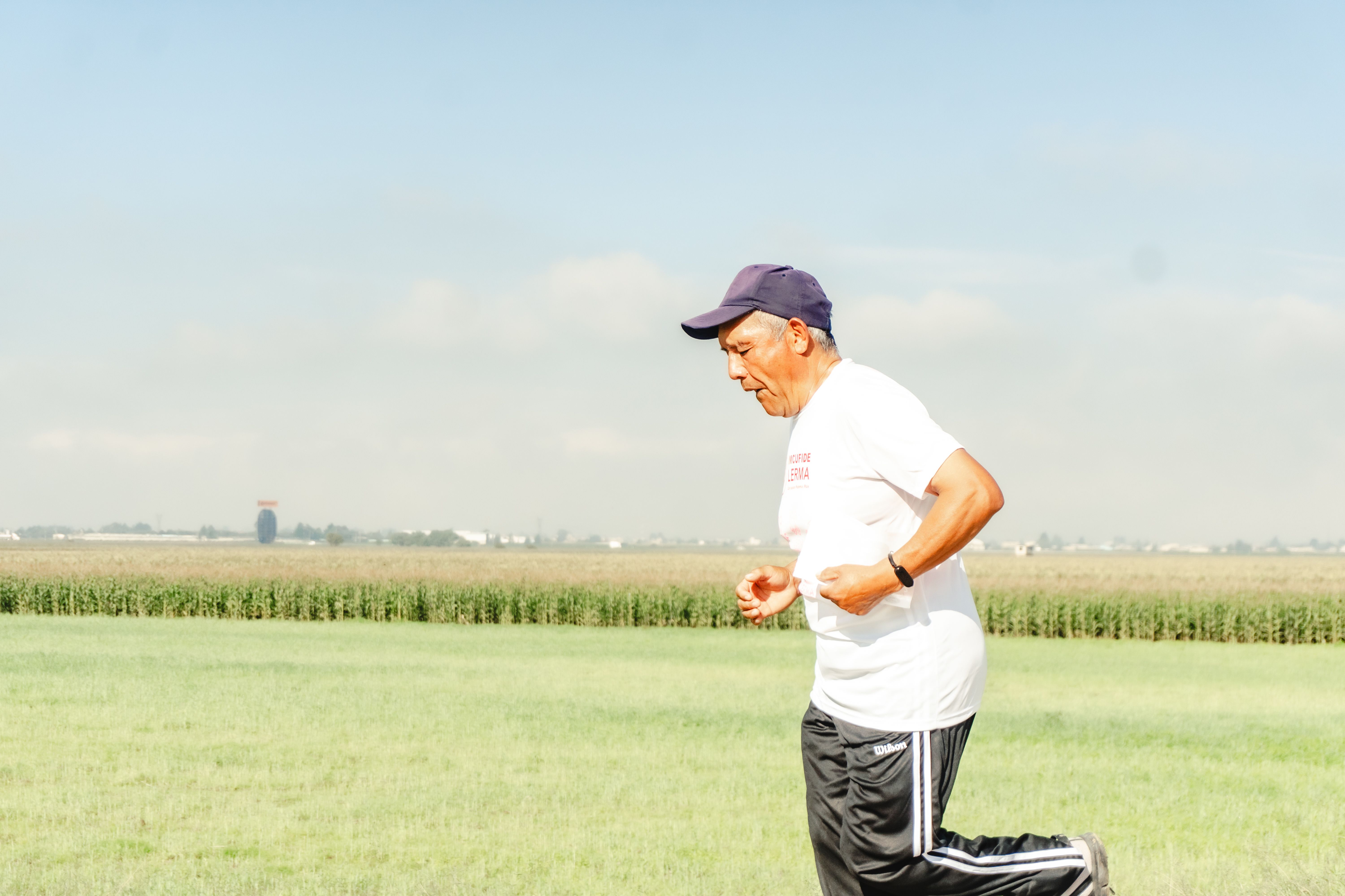 Man in Cap Running · Free Stock Photo