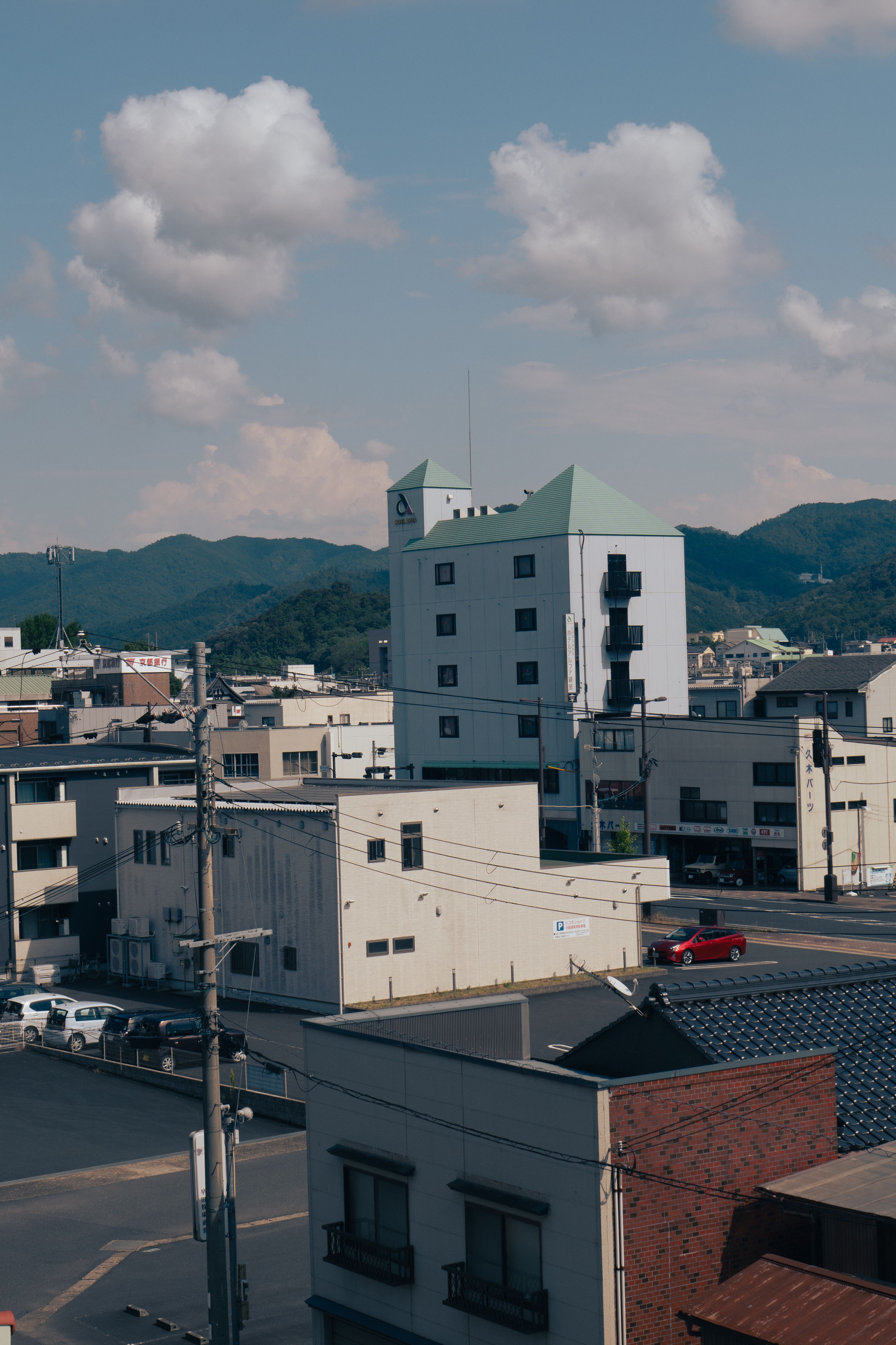 Residential Building in Mountains Landscape · Free Stock Photo