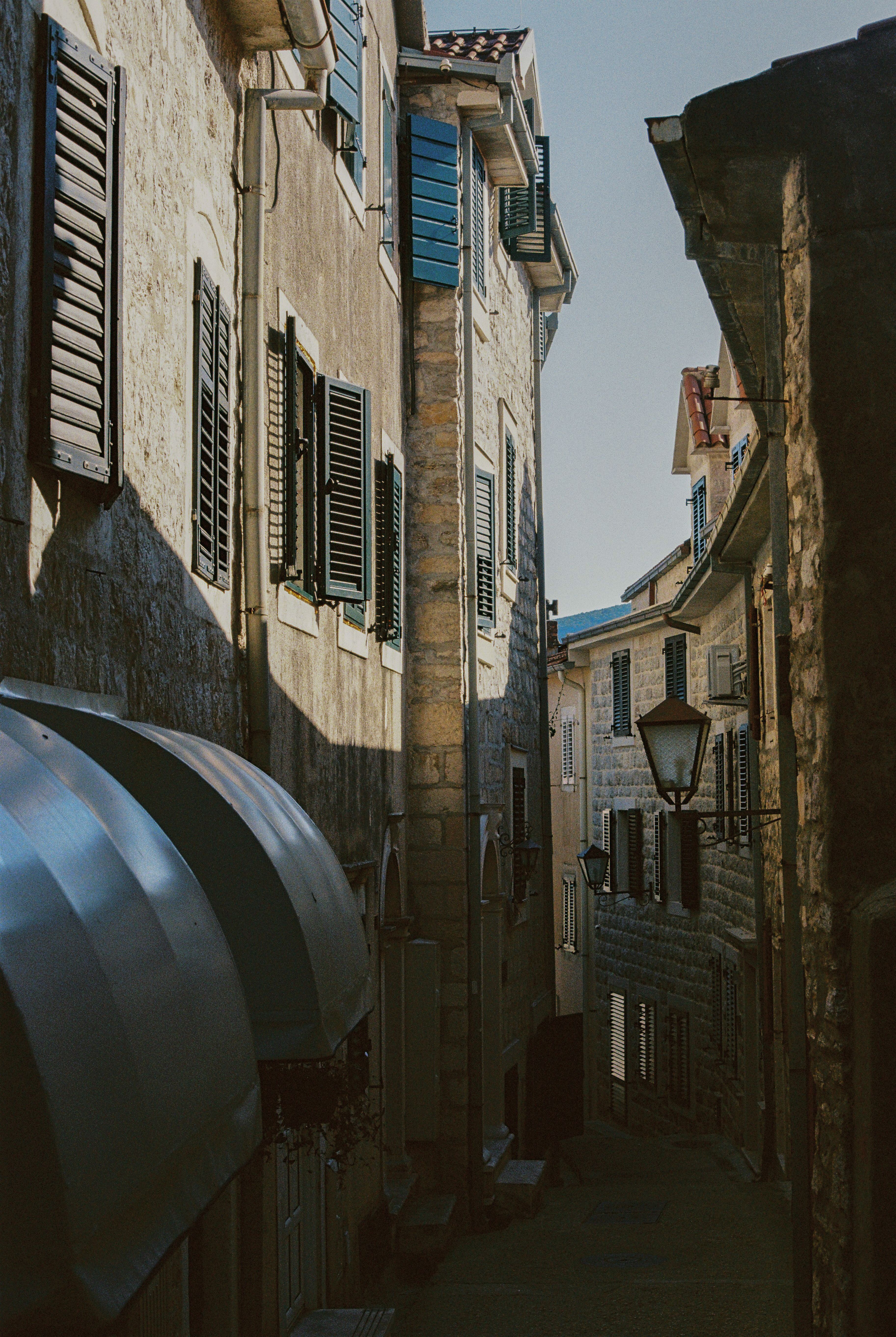 Narrow Old Town Street, and Houses with Window Shutters · Free Stock Photo