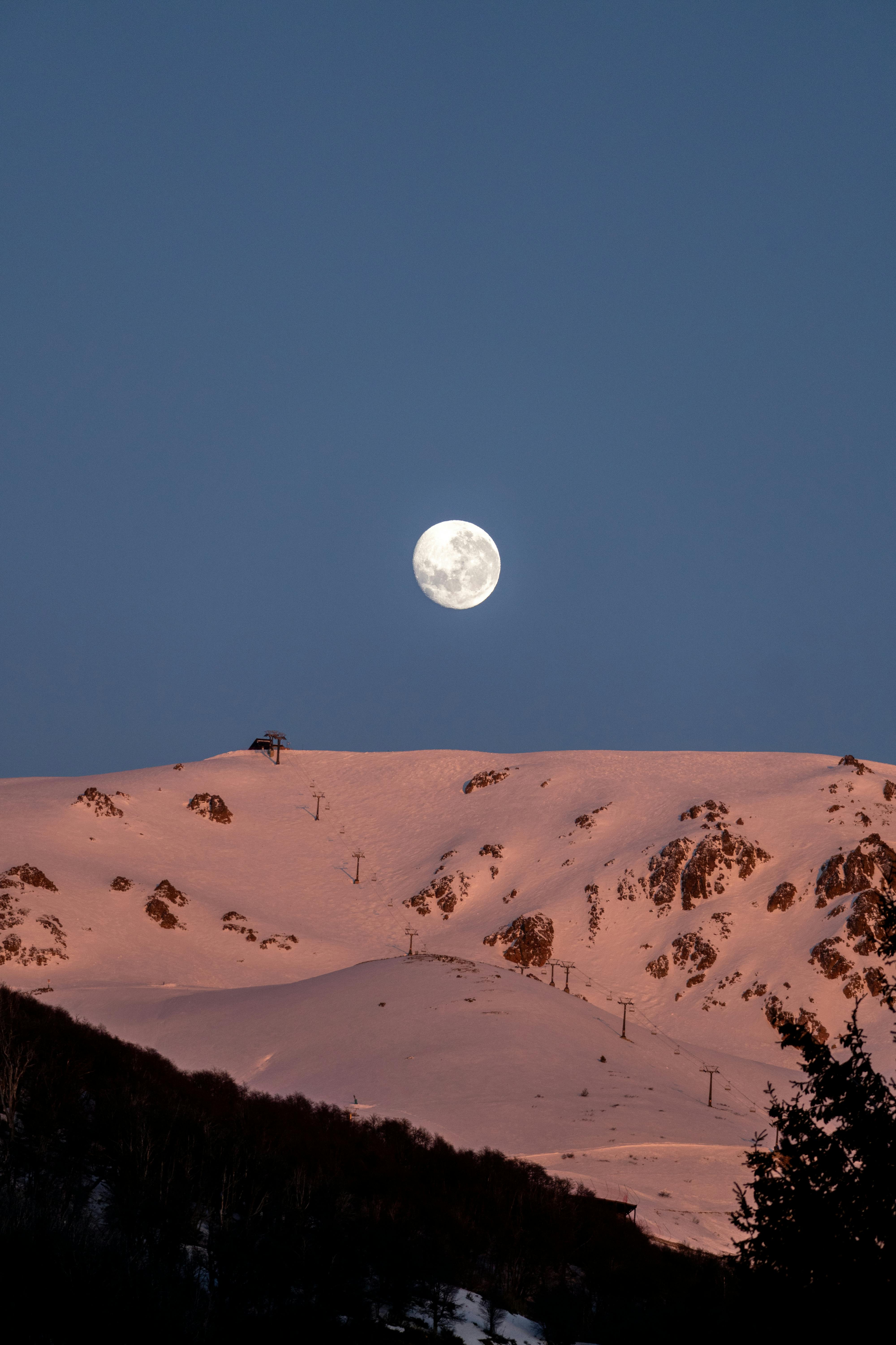 Full Moon over Hill in Winter · Free Stock Photo