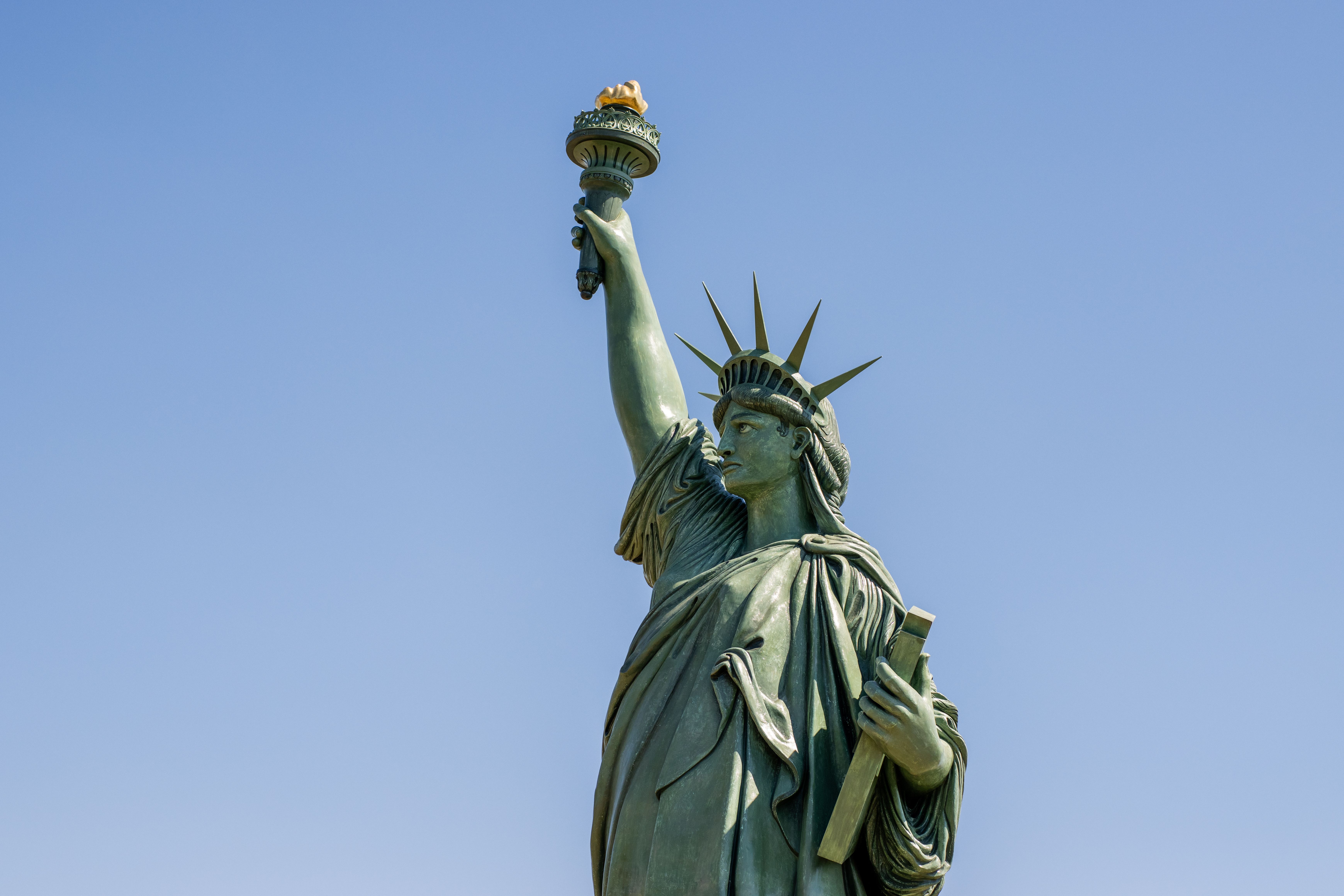 Statue of Liberty Miniature Against the Sky · Free Stock Photo
