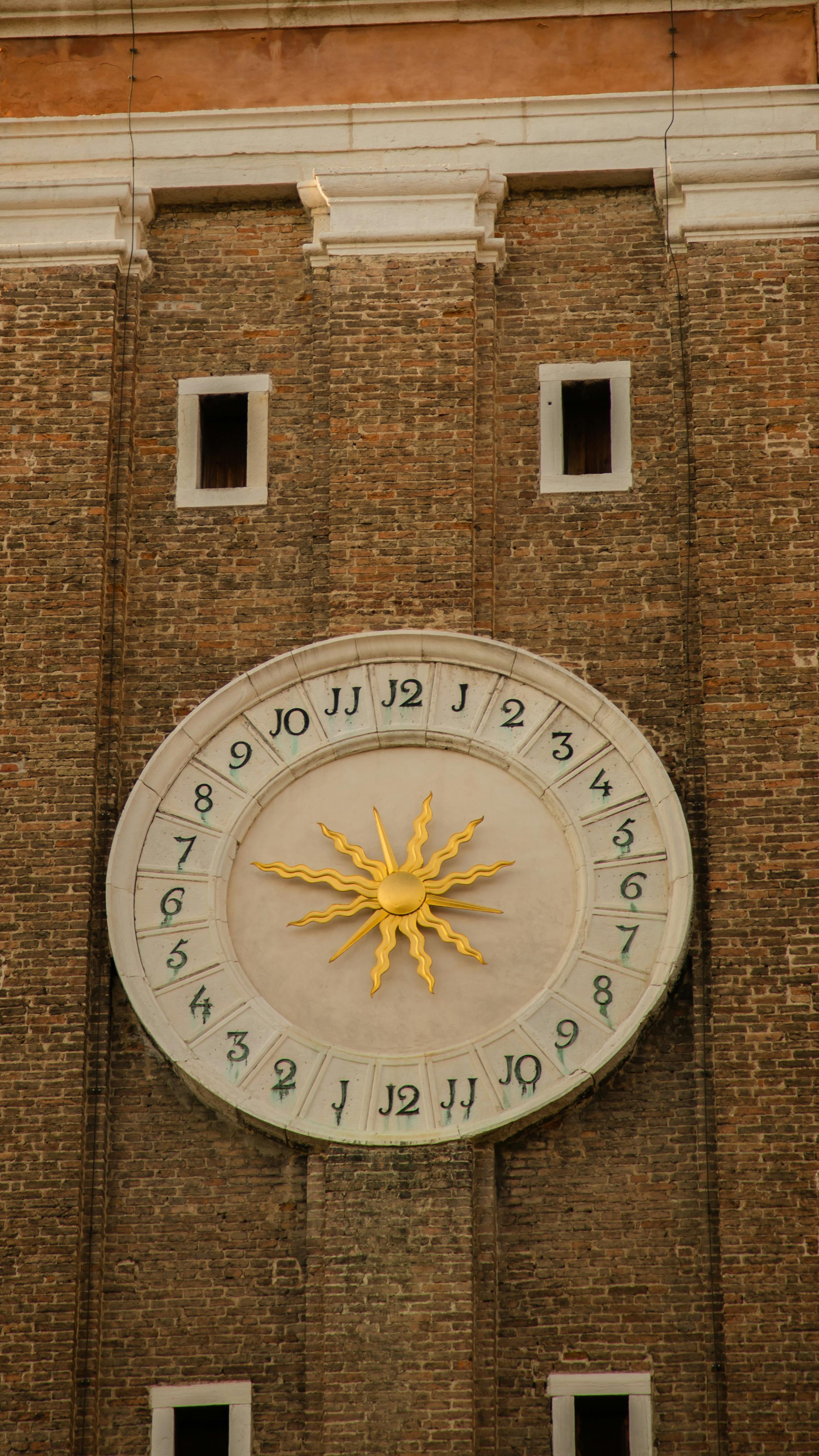 Close-up of an Old Clock on the Facade of the Church of the Holy ...