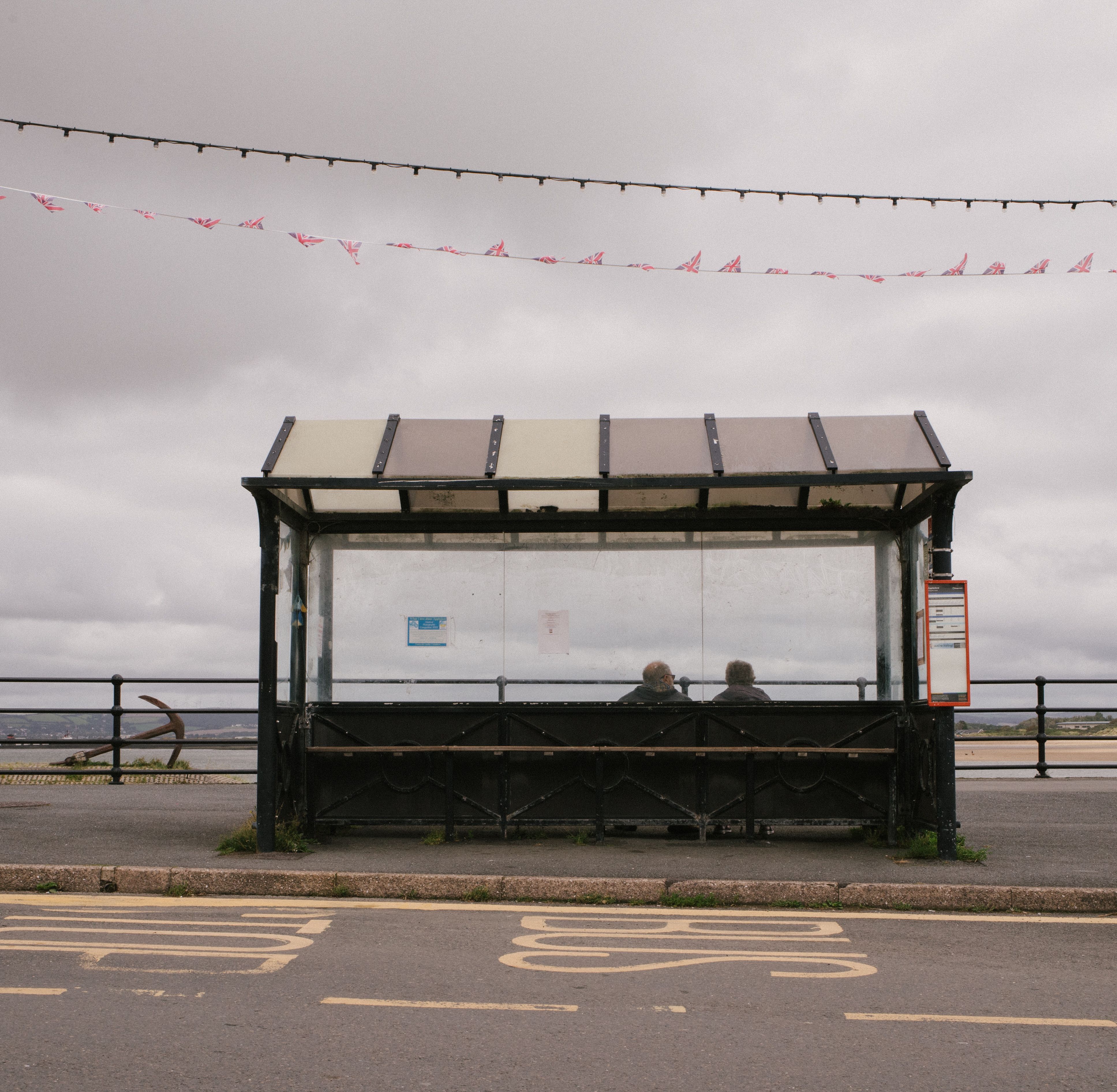 A Bus Stop and an Empty Street · Free Stock Photo