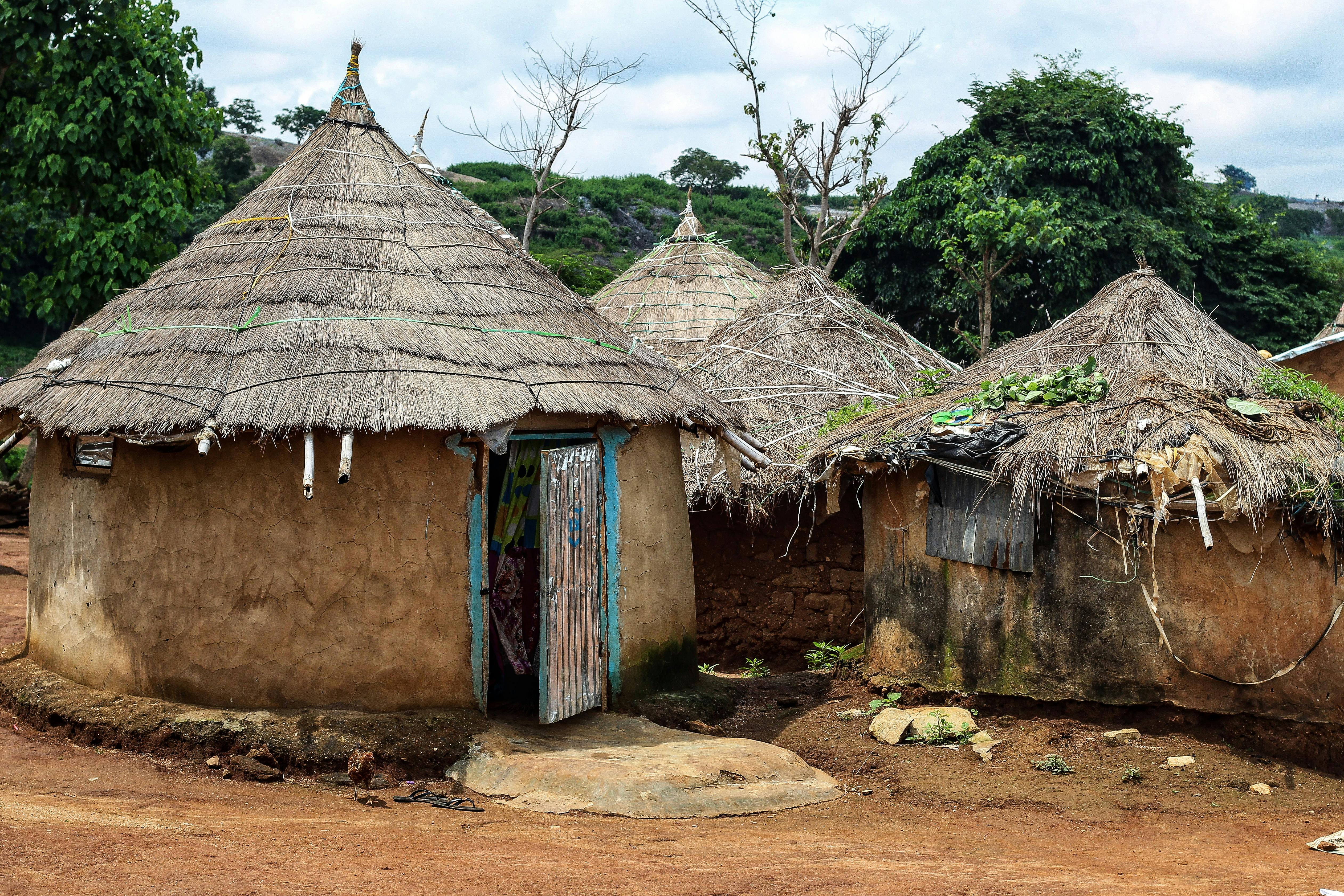 Traditional Clay Huts with Thatched Roofs · Free Stock Photo