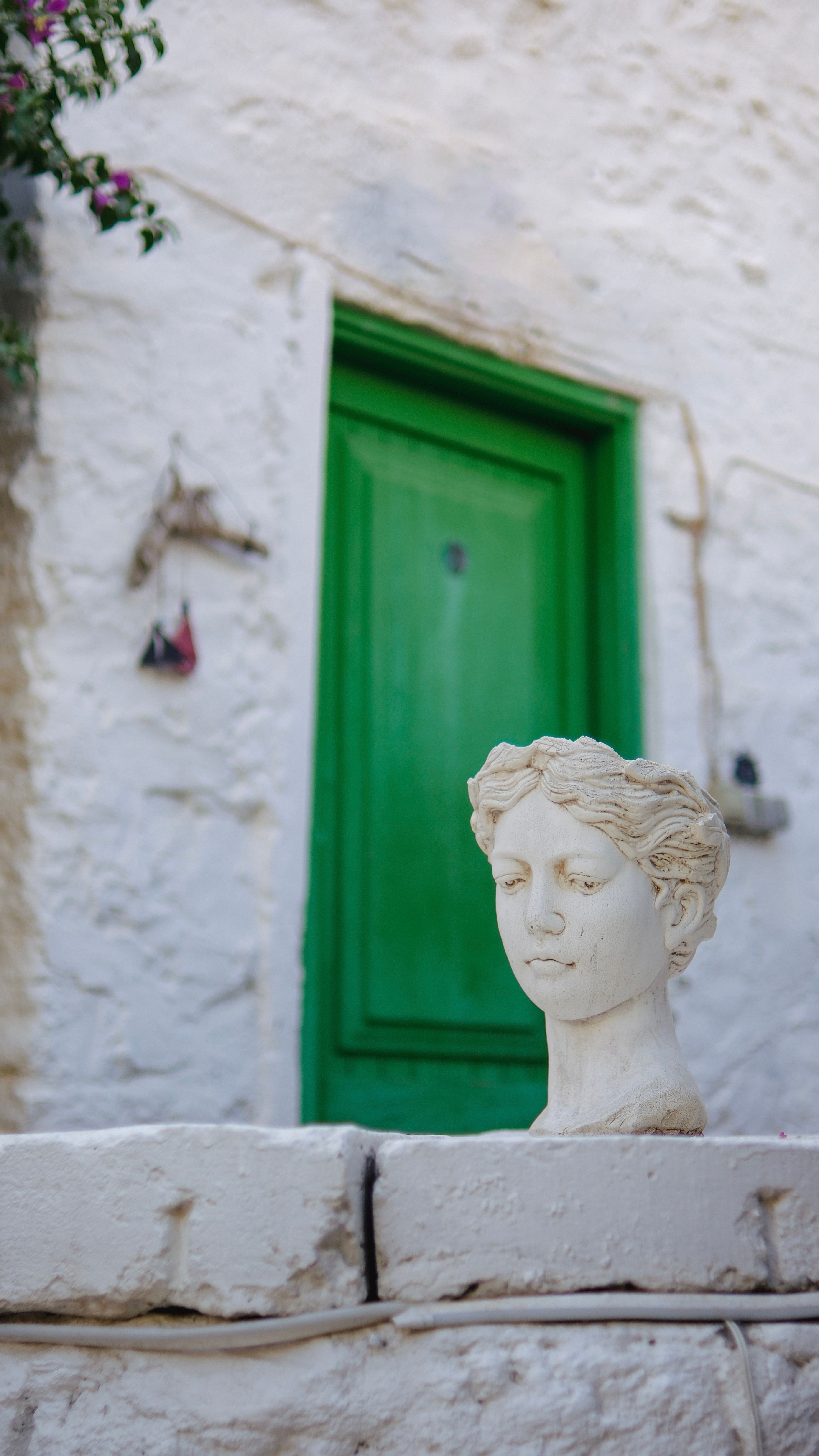 Bust on Columns near Wall in Room · Free Stock Photo