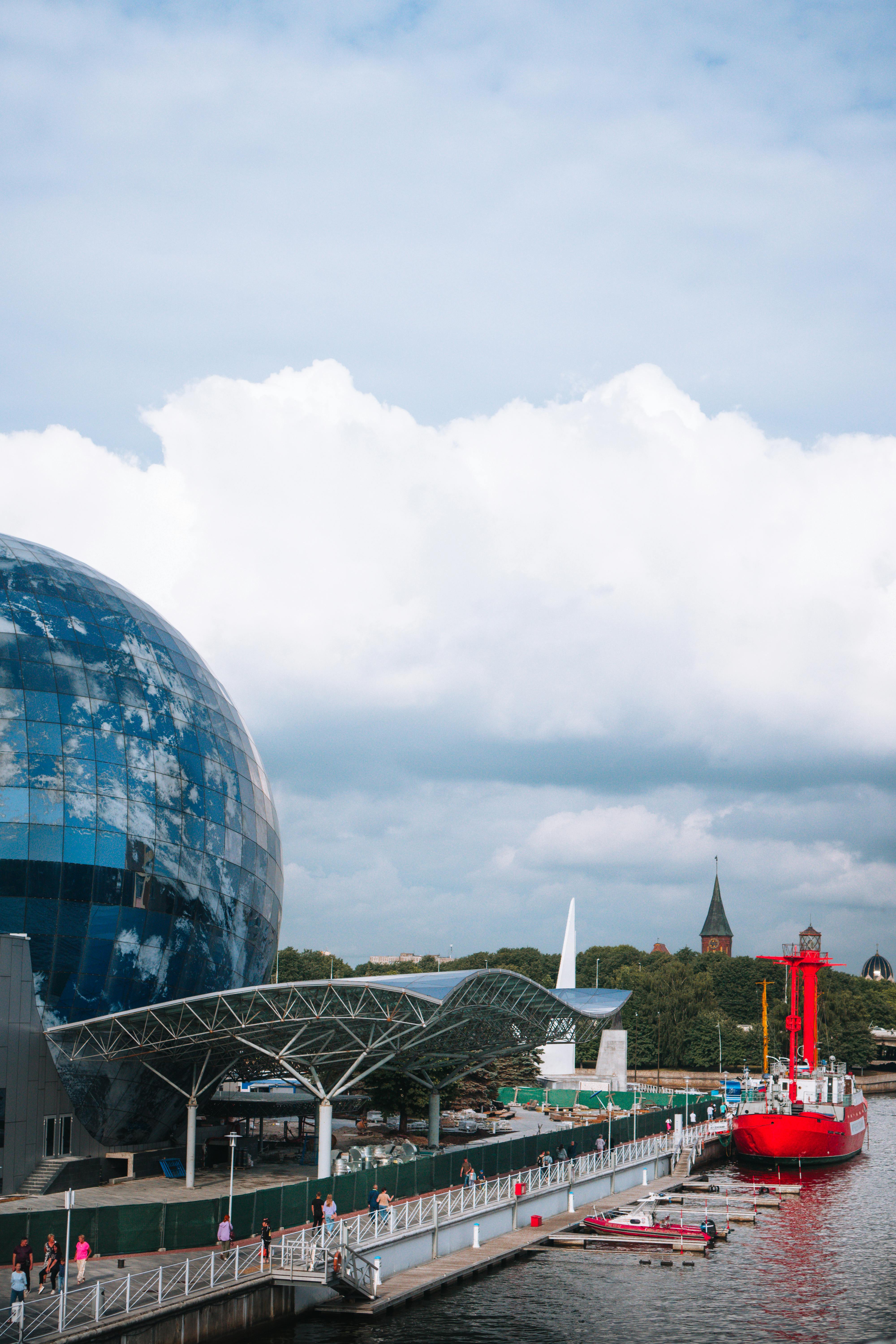 Modern Building by River · Free Stock Photo