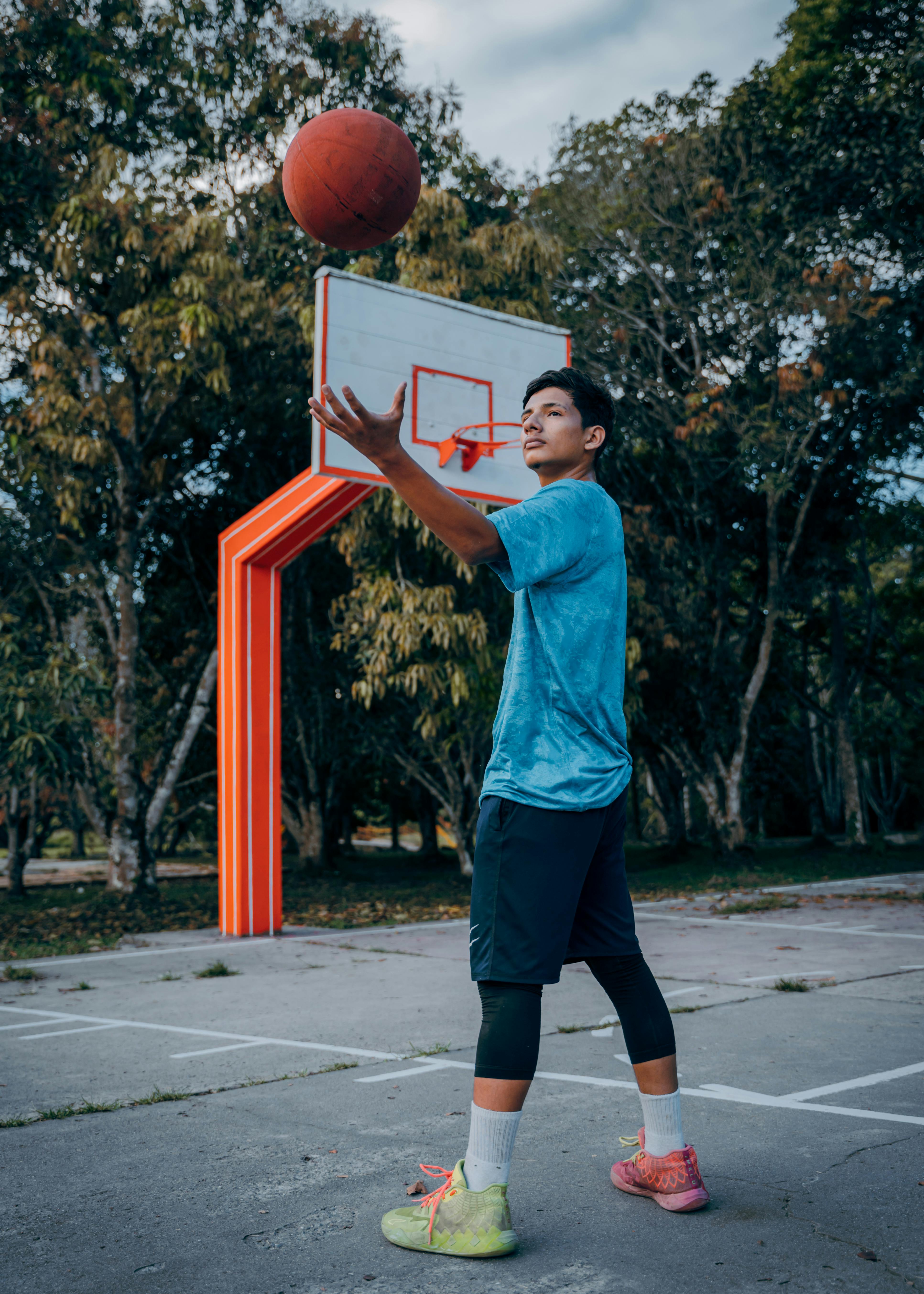 Teenager Playing Basketball · Free Stock Photo