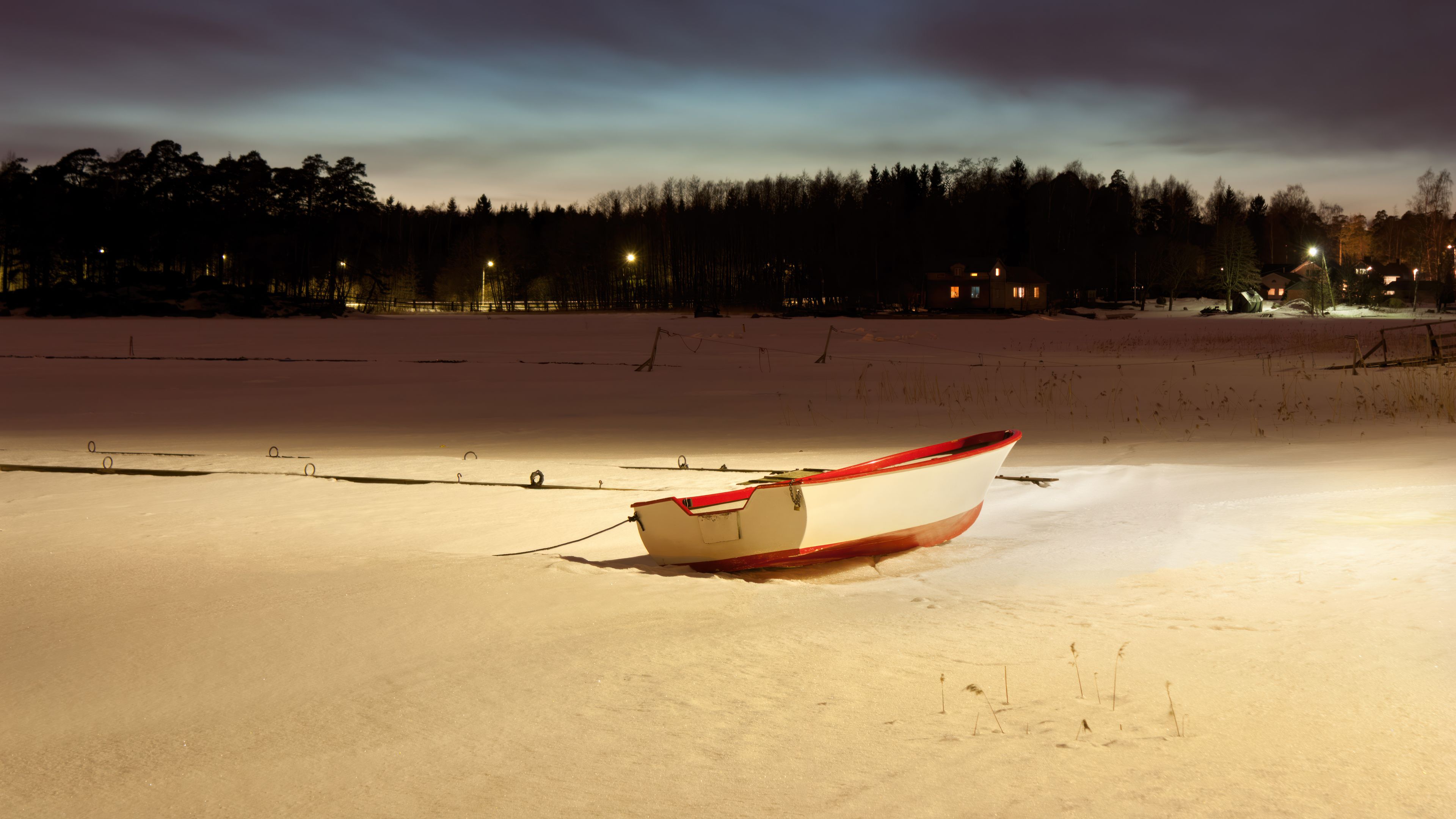 Row Boat Lying on Beach Sand in the Evening · Free Stock Photo
