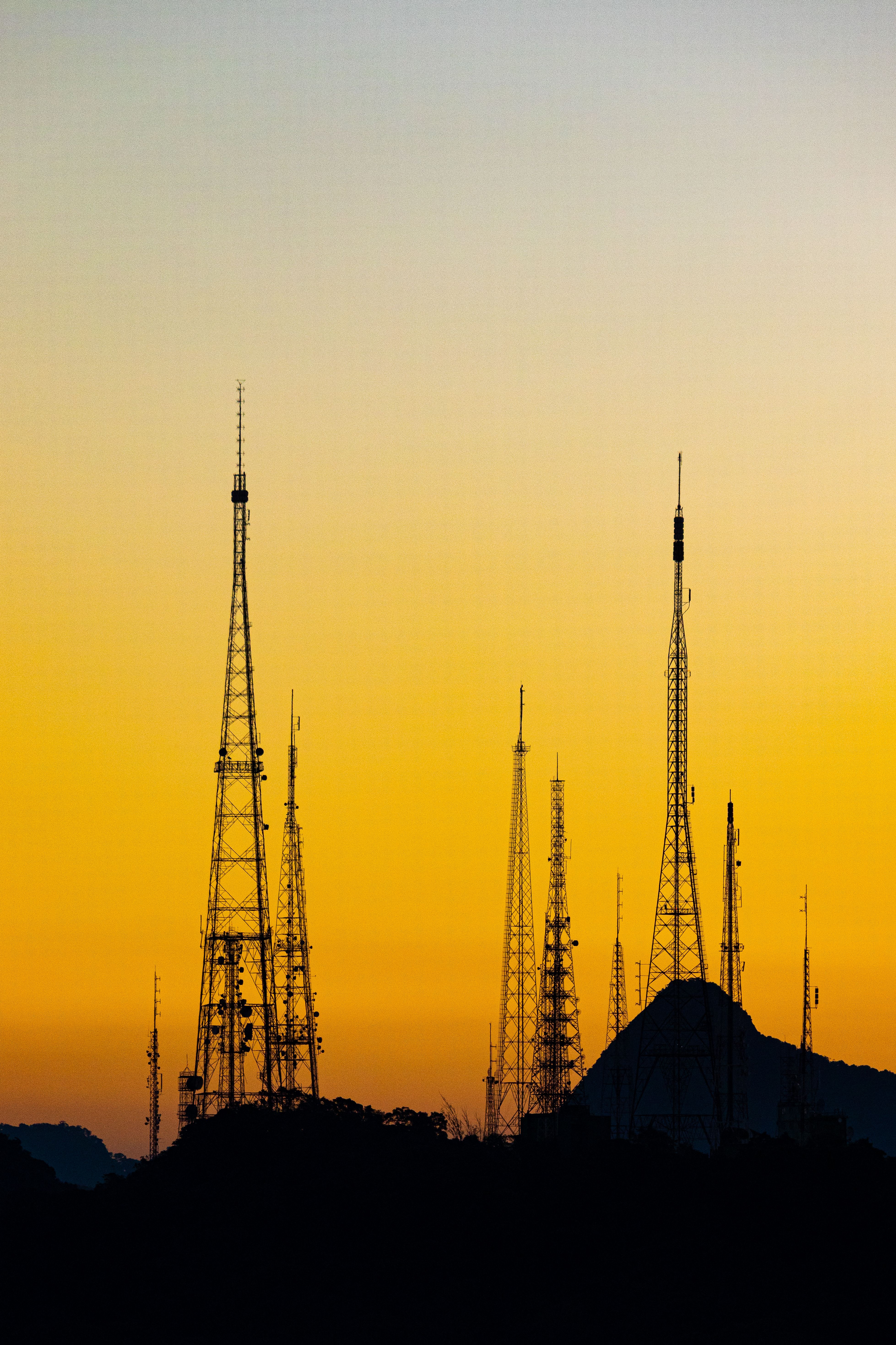 Transmission Towers on a Yellow Sky · Free Stock Photo