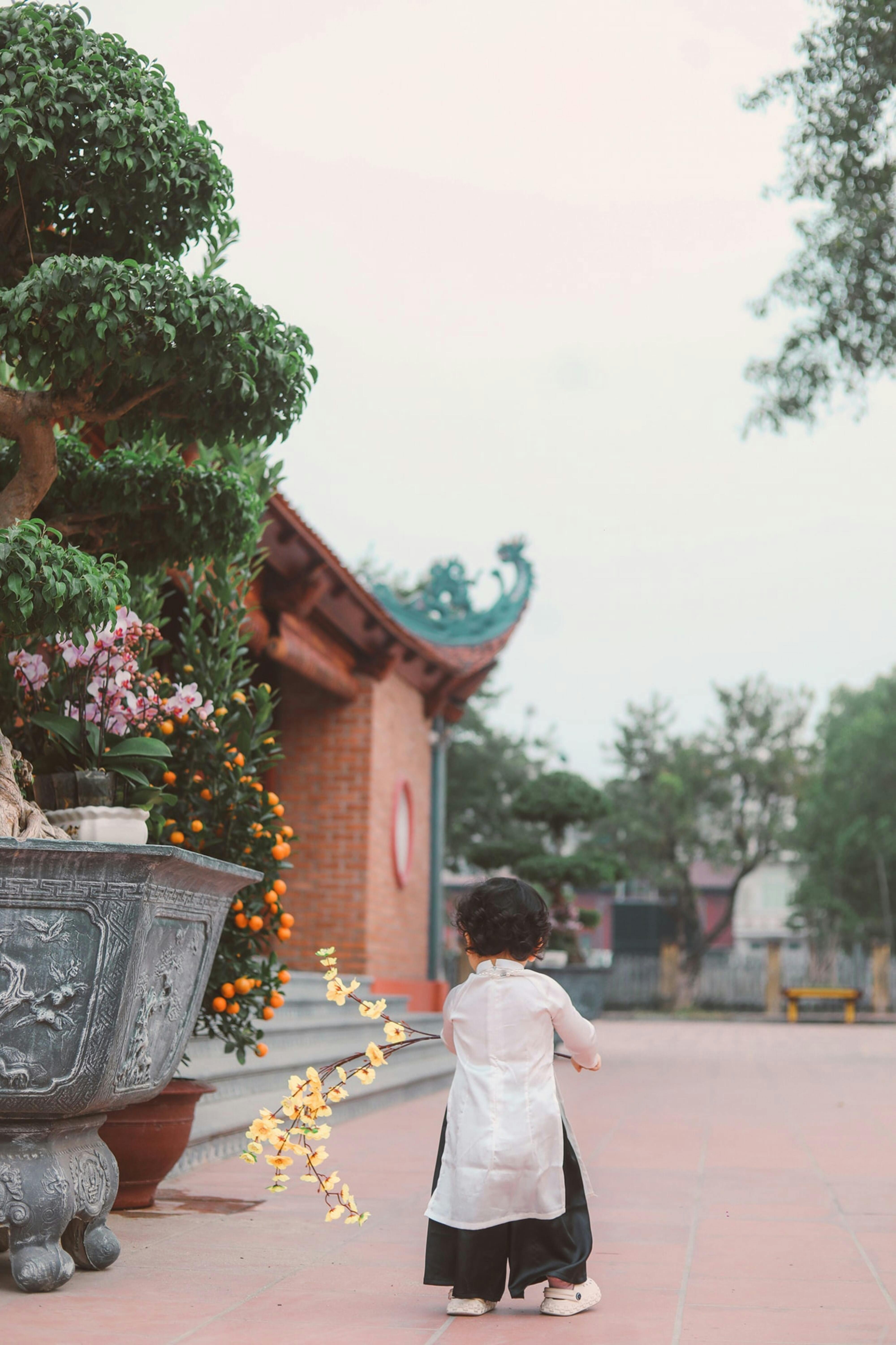 Little Boy Wearing White Changpao · Free Stock Photo