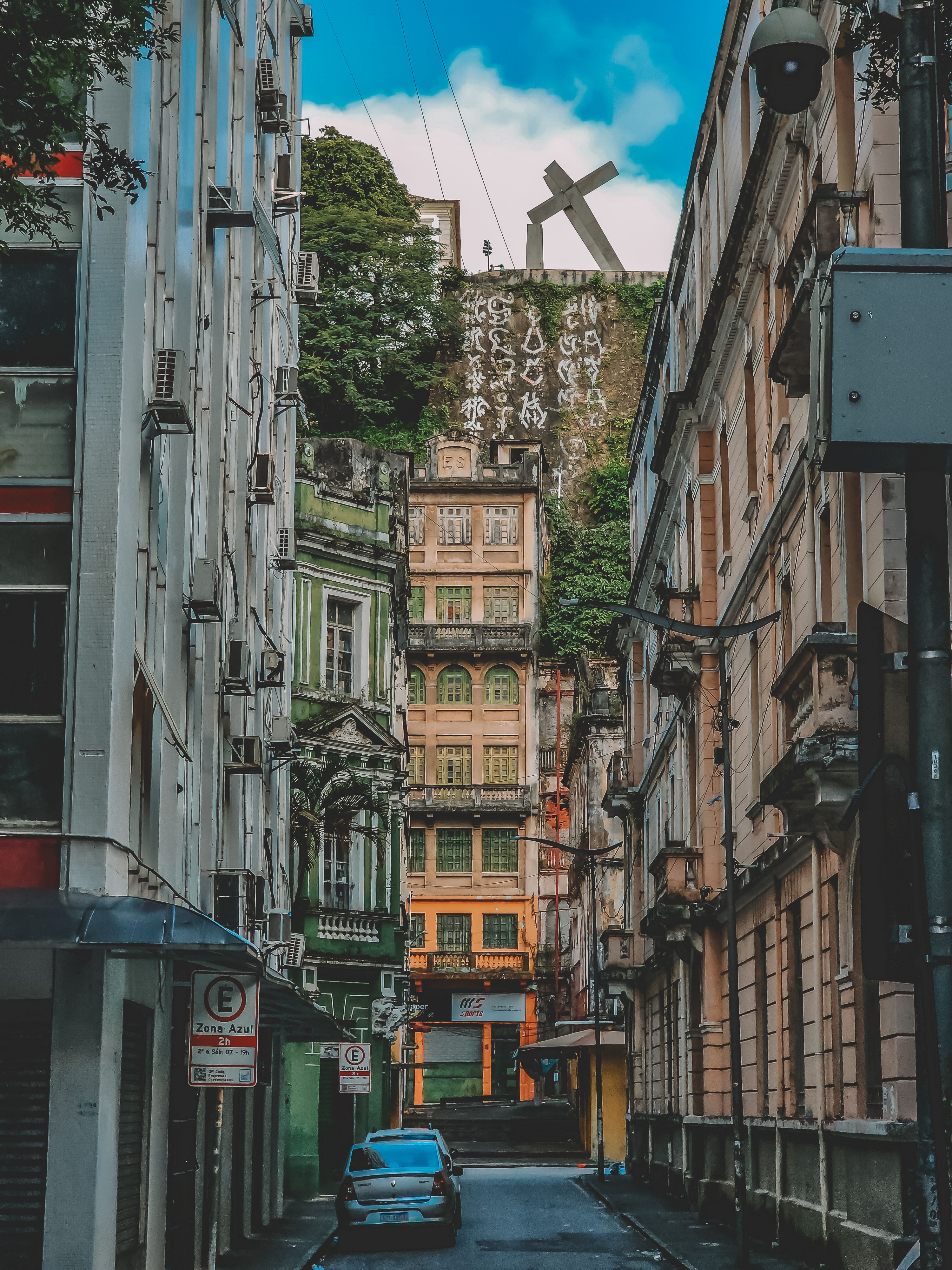 Classic Buildings on Narrow City Street · Free Stock Photo
